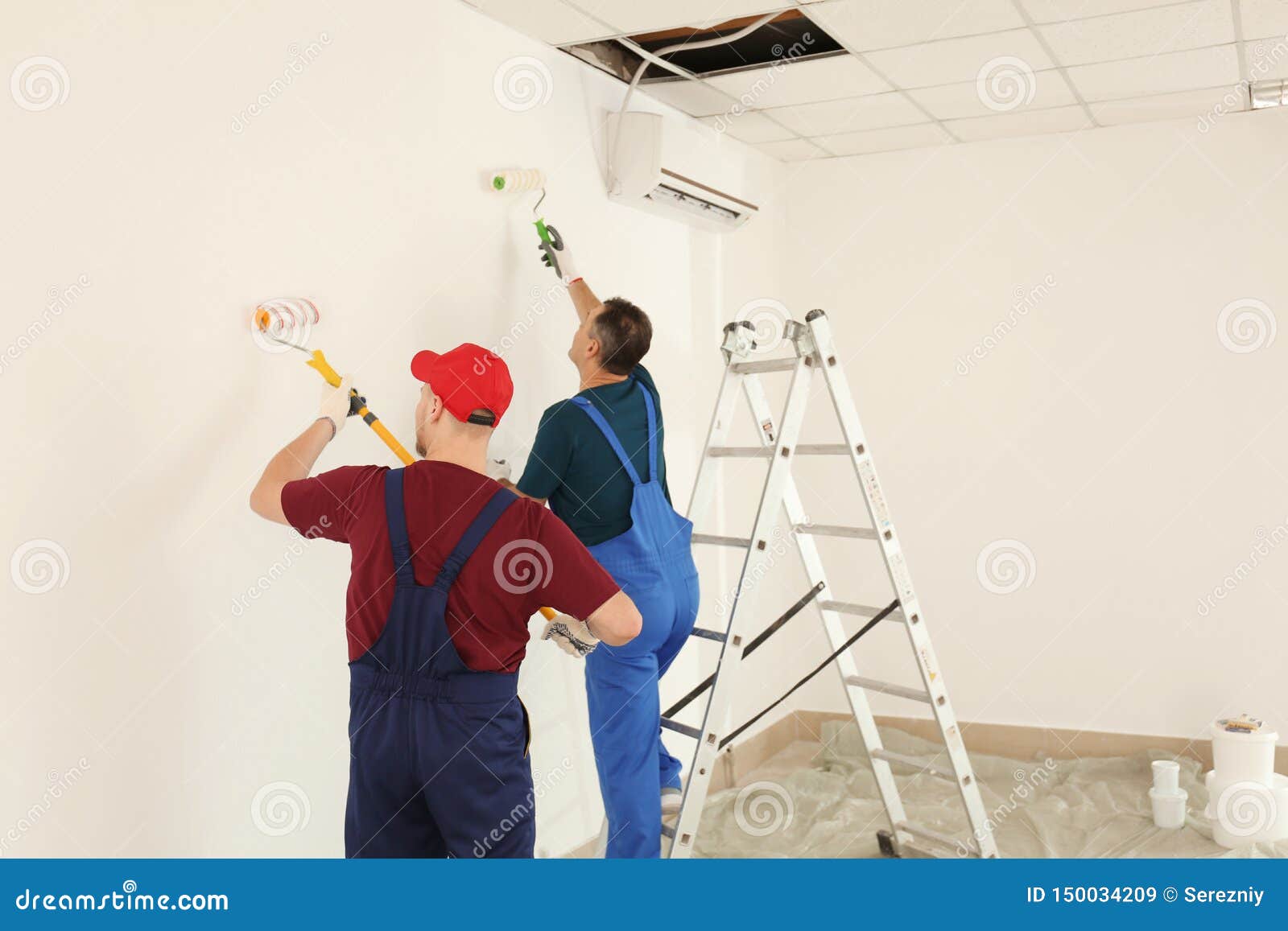 Male Painters in Uniform Working Indoors Stock Image - Image of ...