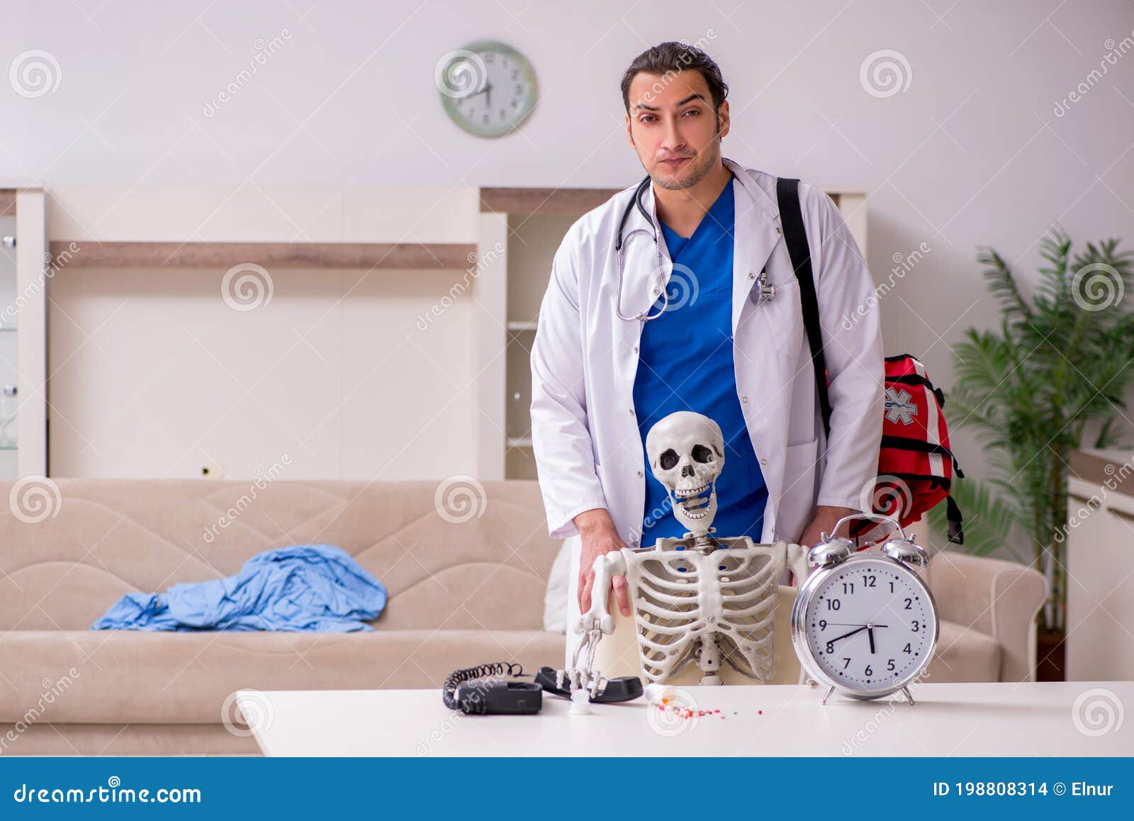Young Male Paramedic Visiting Skeleton Patient Stock Photo - Image of ...