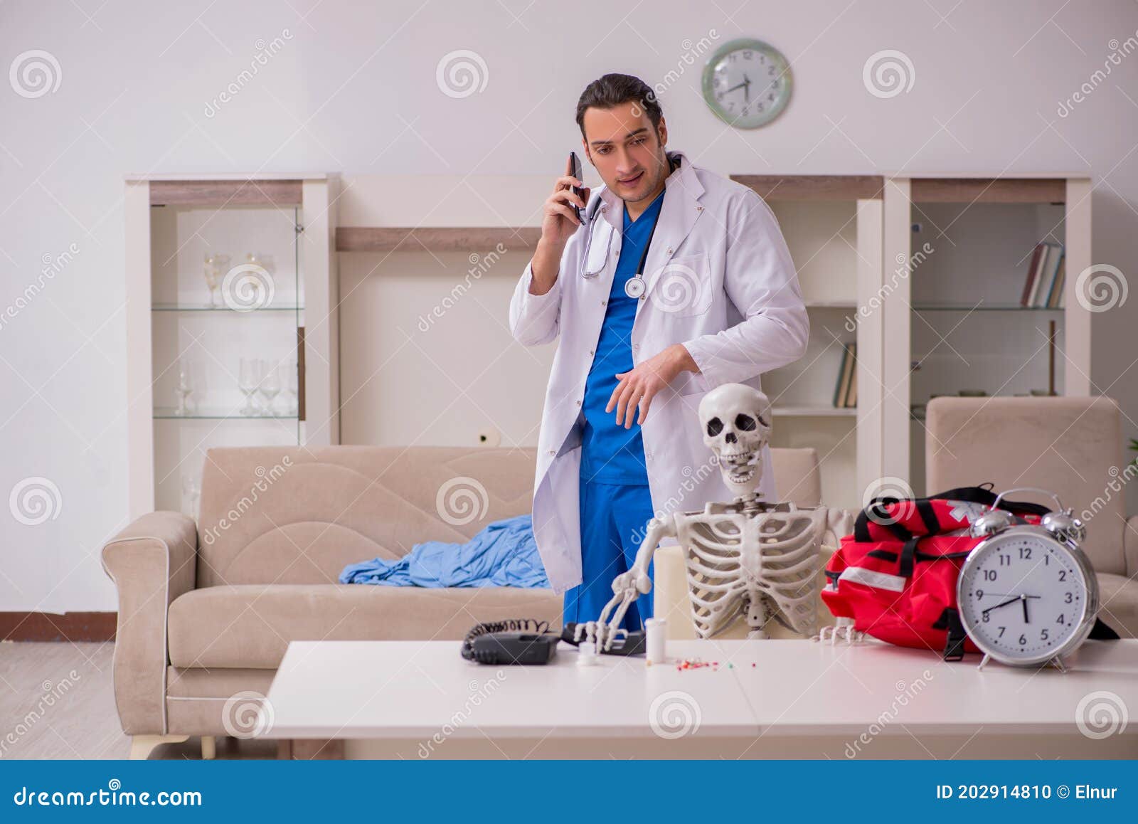 Young Male Paramedic Visiting Skeleton Patient Stock Photo - Image of ...