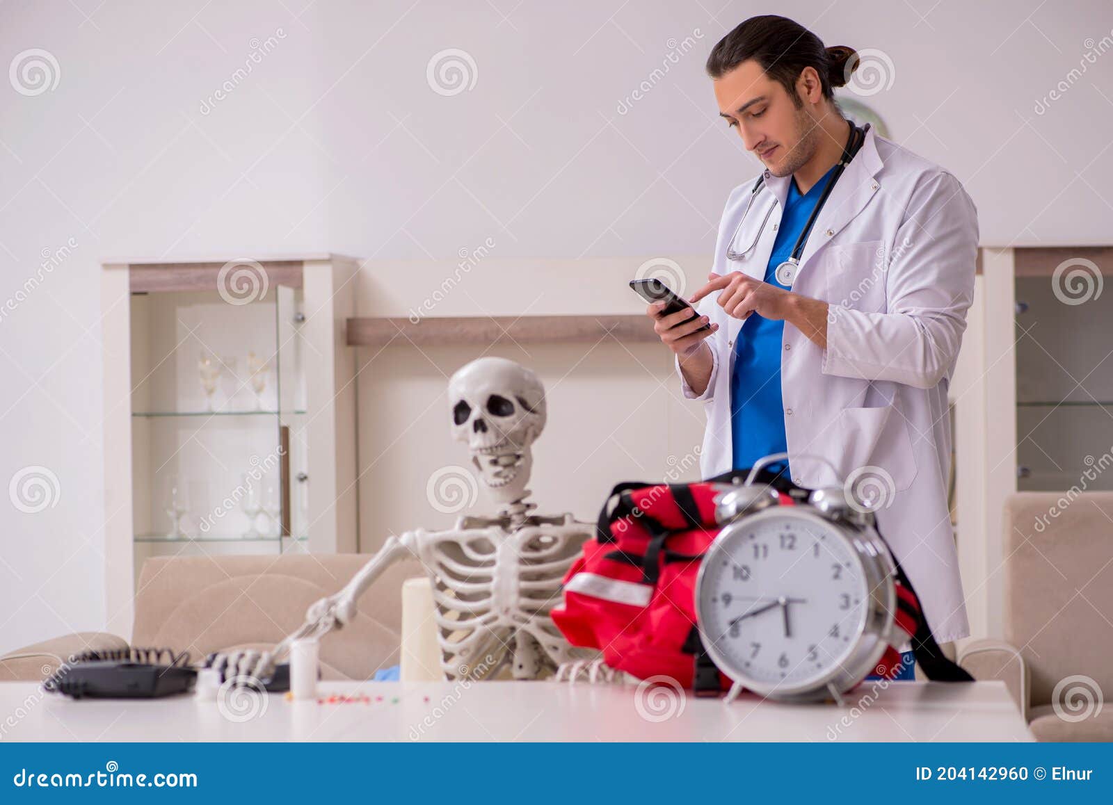 Young Male Paramedic Visiting Skeleton Patient Stock Photo - Image of ...