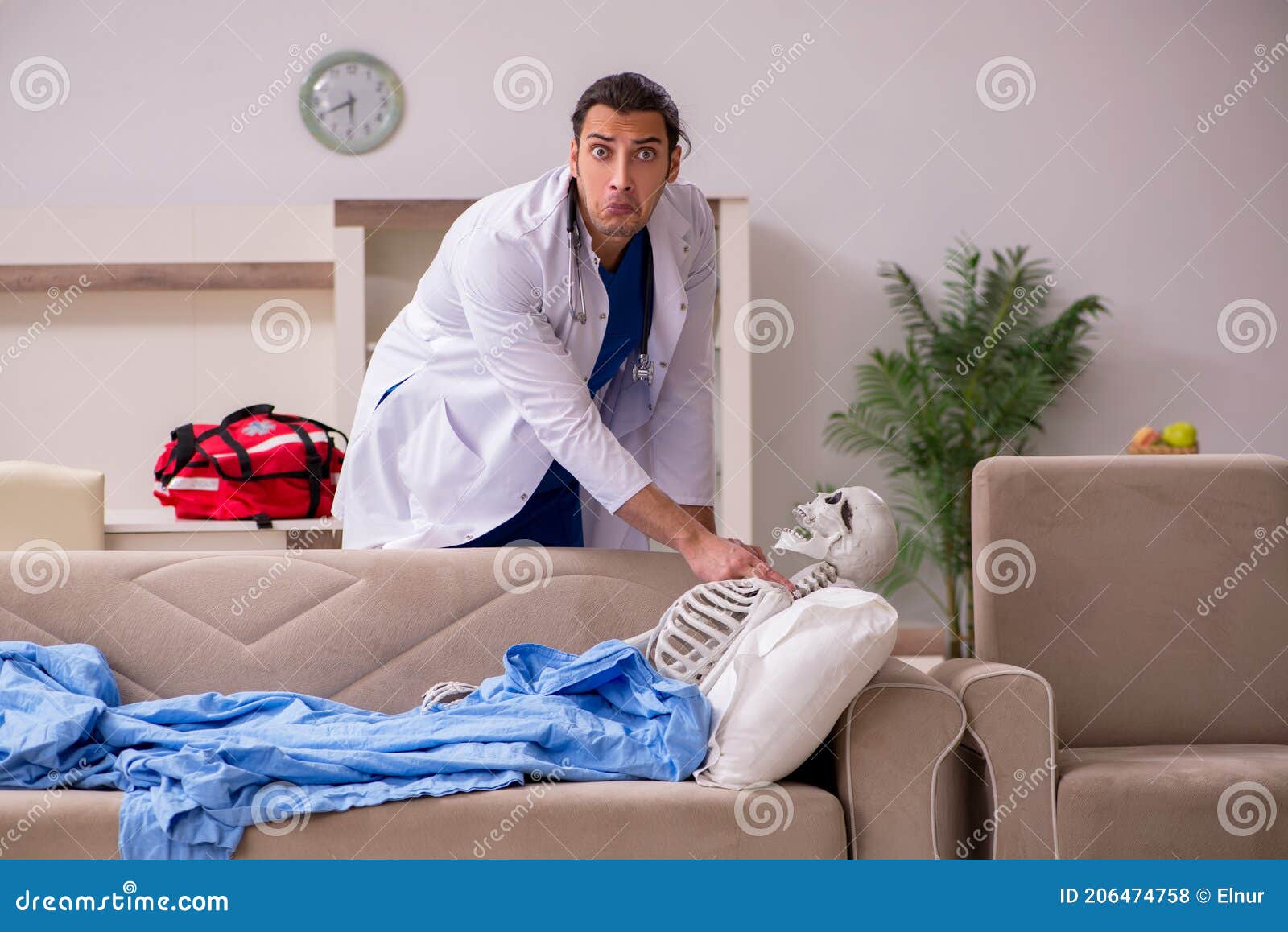 Young Male Paramedic Visiting Skeleton Patient Stock Photo - Image of ...