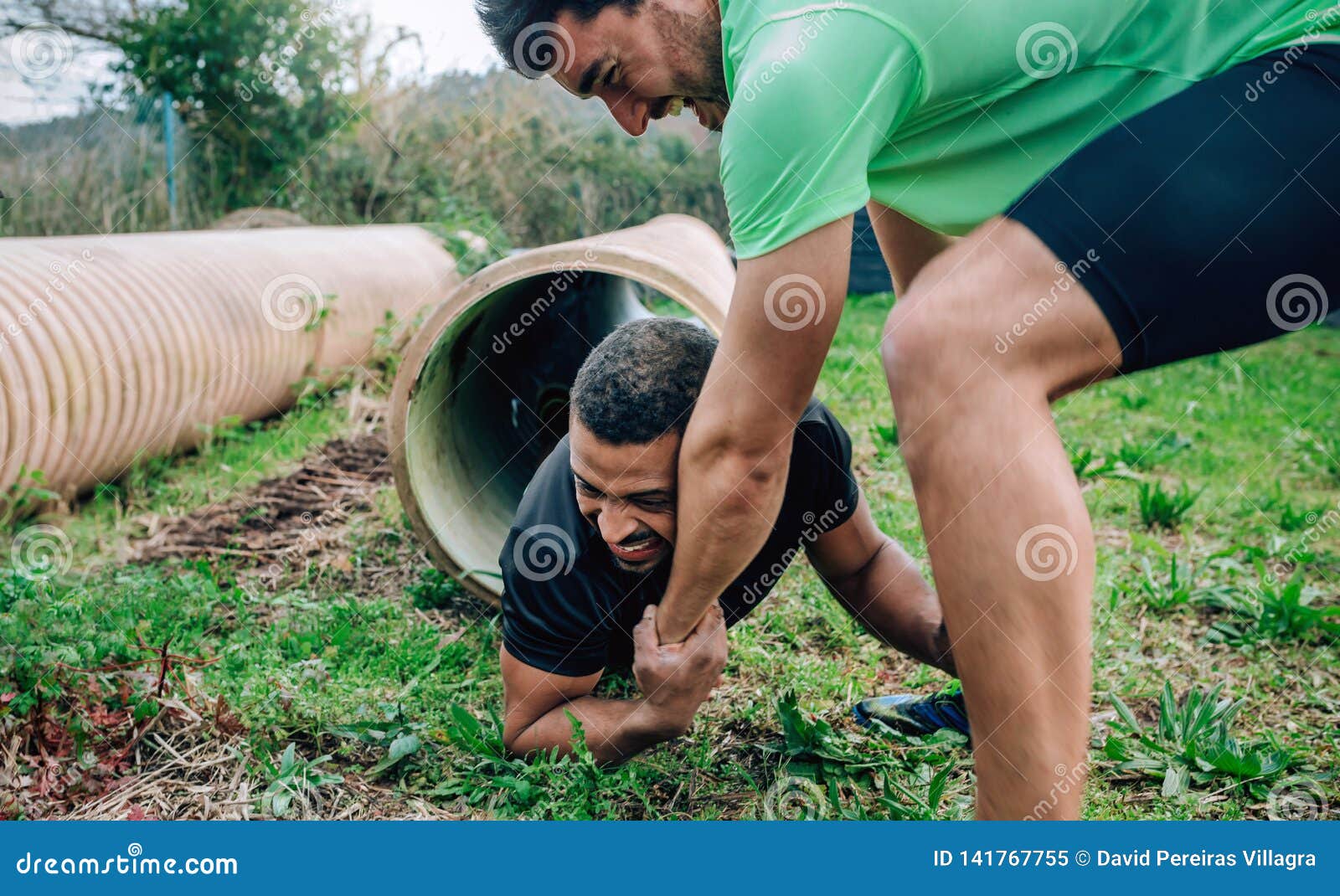 Participants Obstacle Course Going through a Pipe Stock Image - Image ...