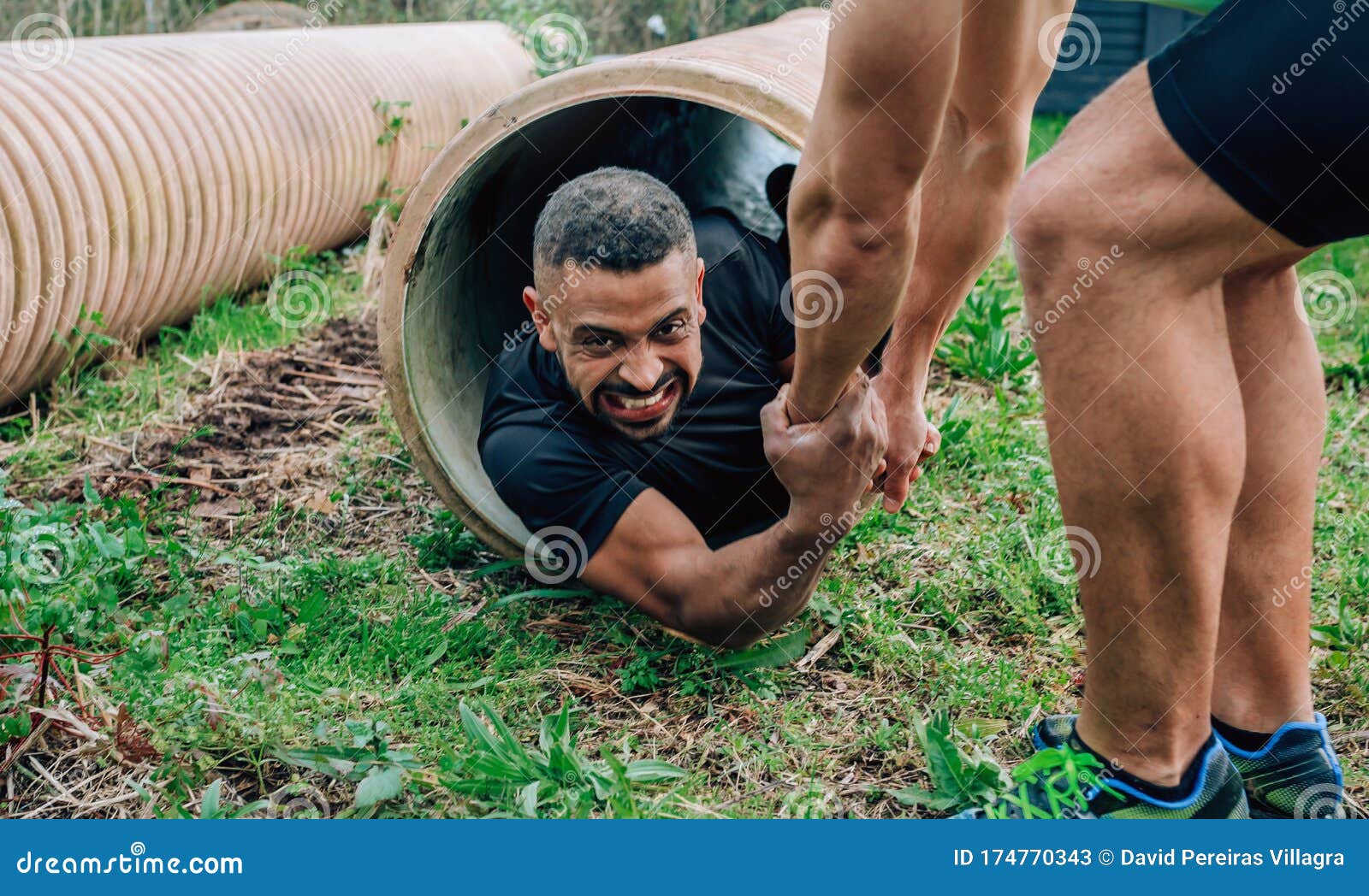 Participants Obstacle Course Going through a Pipe Stock Image - Image ...