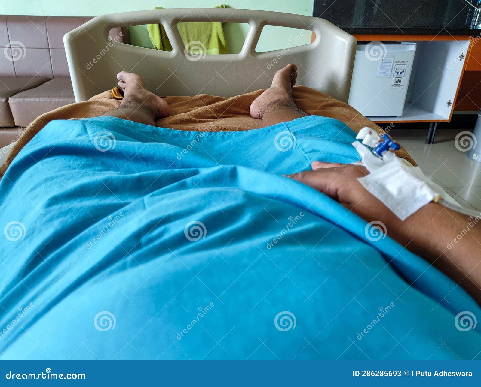 Male patient being treated stock image. Image of medical - 286285693