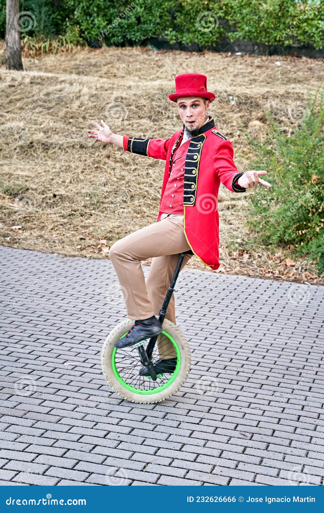 Male Performer Riding Unicycle in Park Stock Photo - Image of male ...