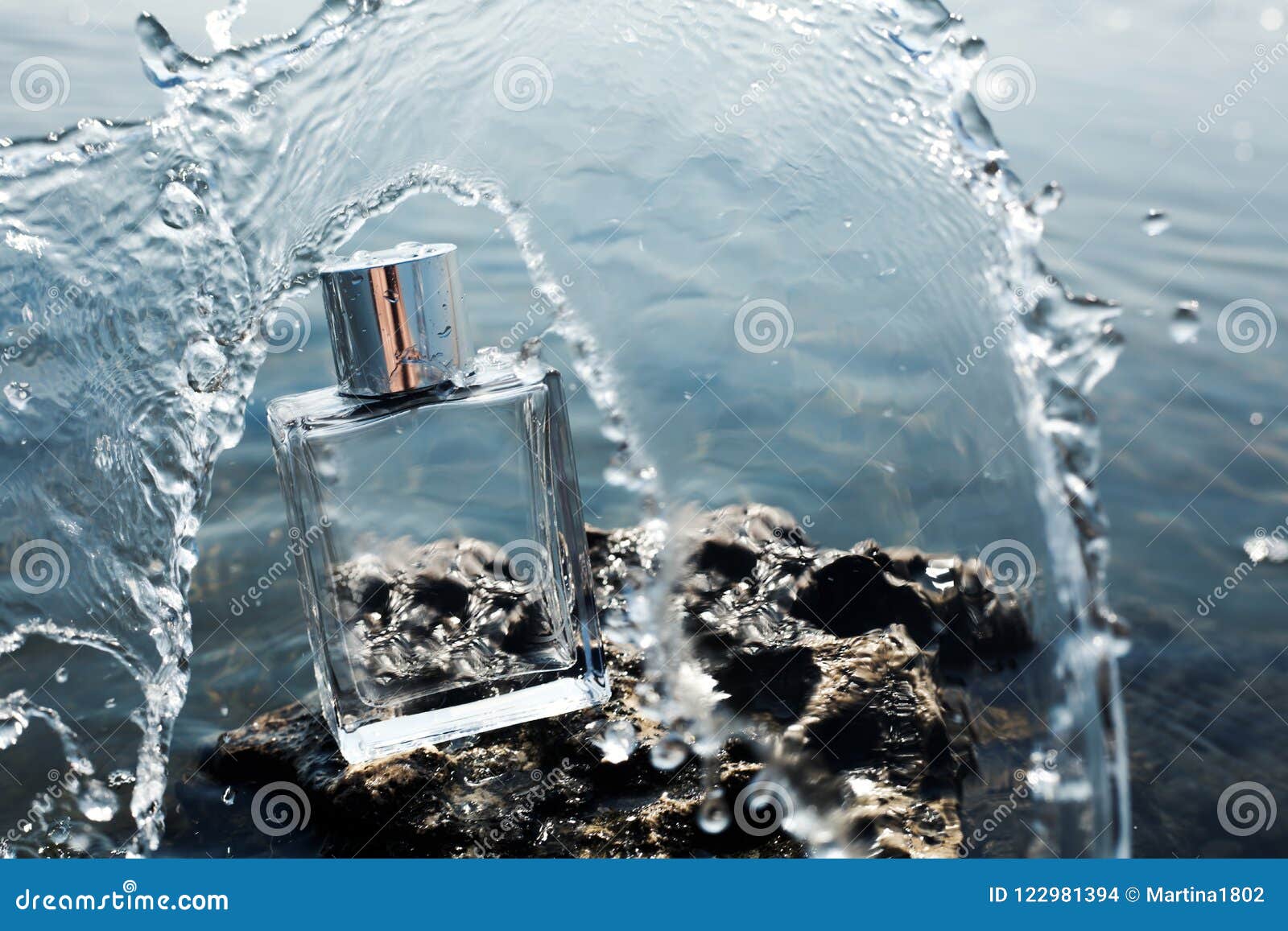 Perfume Bottle in Water Splashes Stock Photo - Image of fragrances ...