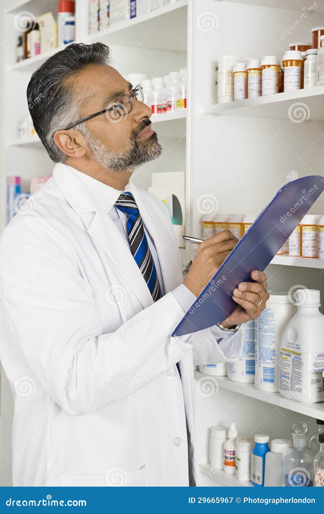 Male Pharmacist Working in Pharmacy Stock Image - Image of pharmacist ...