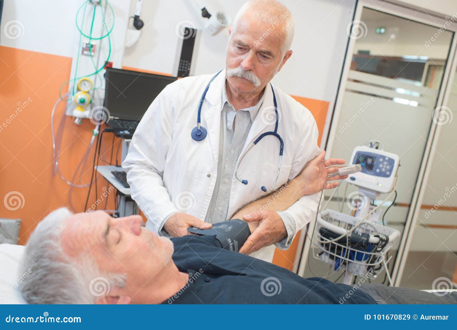 Male Physio Therapist Treating Senior Man Stock Image - Image of ...