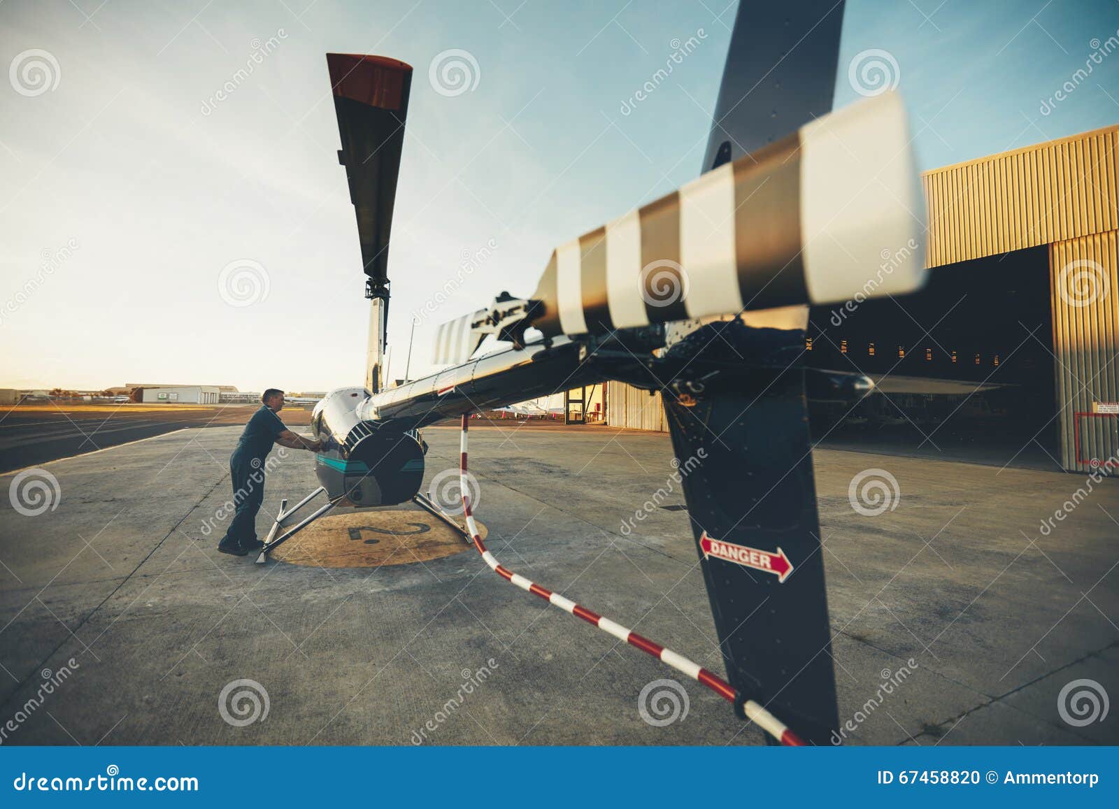 Male Pilot Inspecting Helicopter Stock Photo - Image of engineer ...