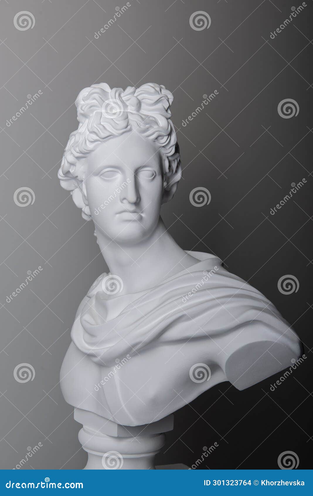 Male Plaster Statue Head in Studio Over Gray Background Stock Photo ...