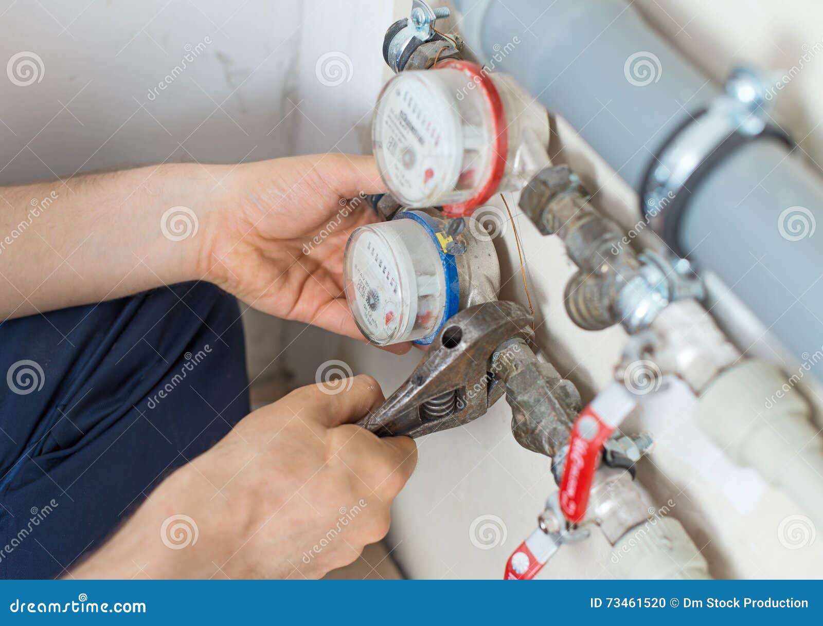 Male Plumber Fixing Water Meter. Stock Photo - Image of adjustable ...