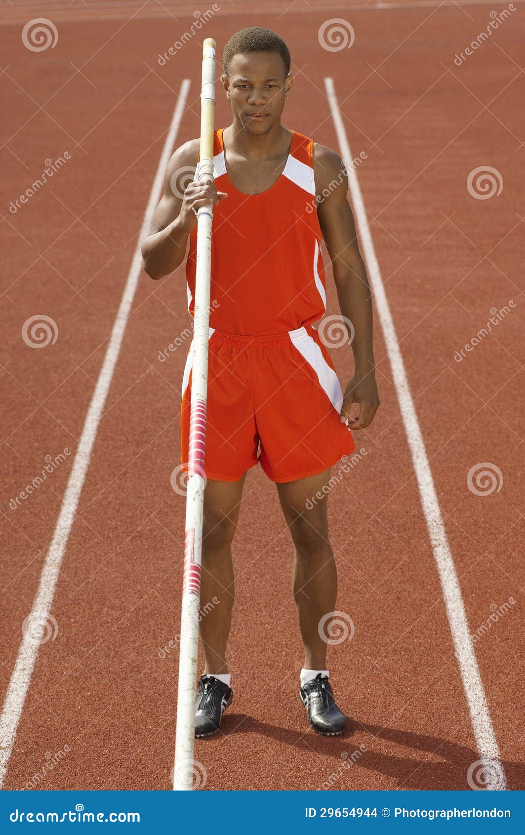 Male Pole Vaulter Holding Pole Stock Photo - Image of pole, person ...