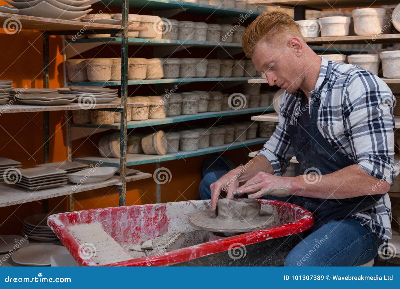Male potter making a pot stock image. Image of artist - 101307389