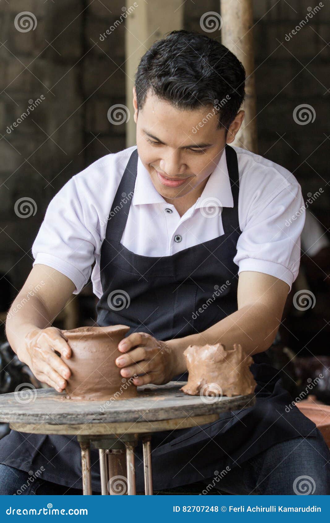 Male potter making pot stock photo. Image of professional - 82707248