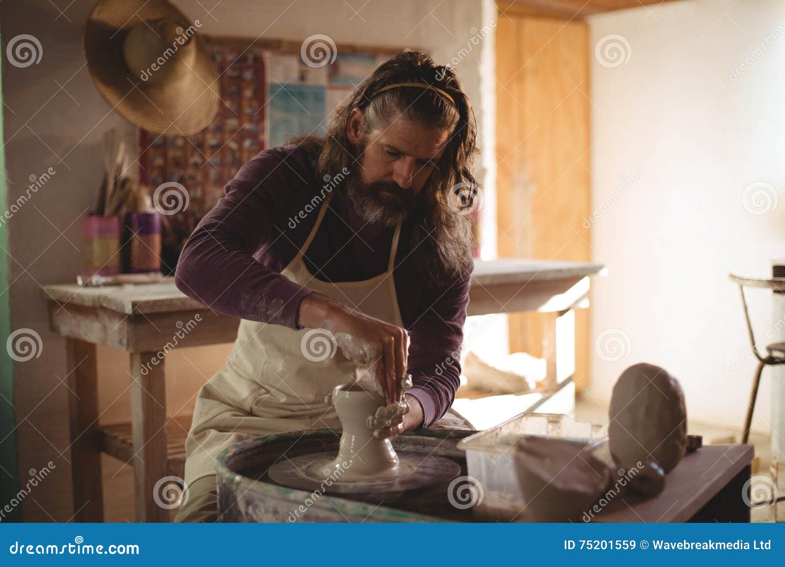 Male potter making pot stock image. Image of shaping - 75201559
