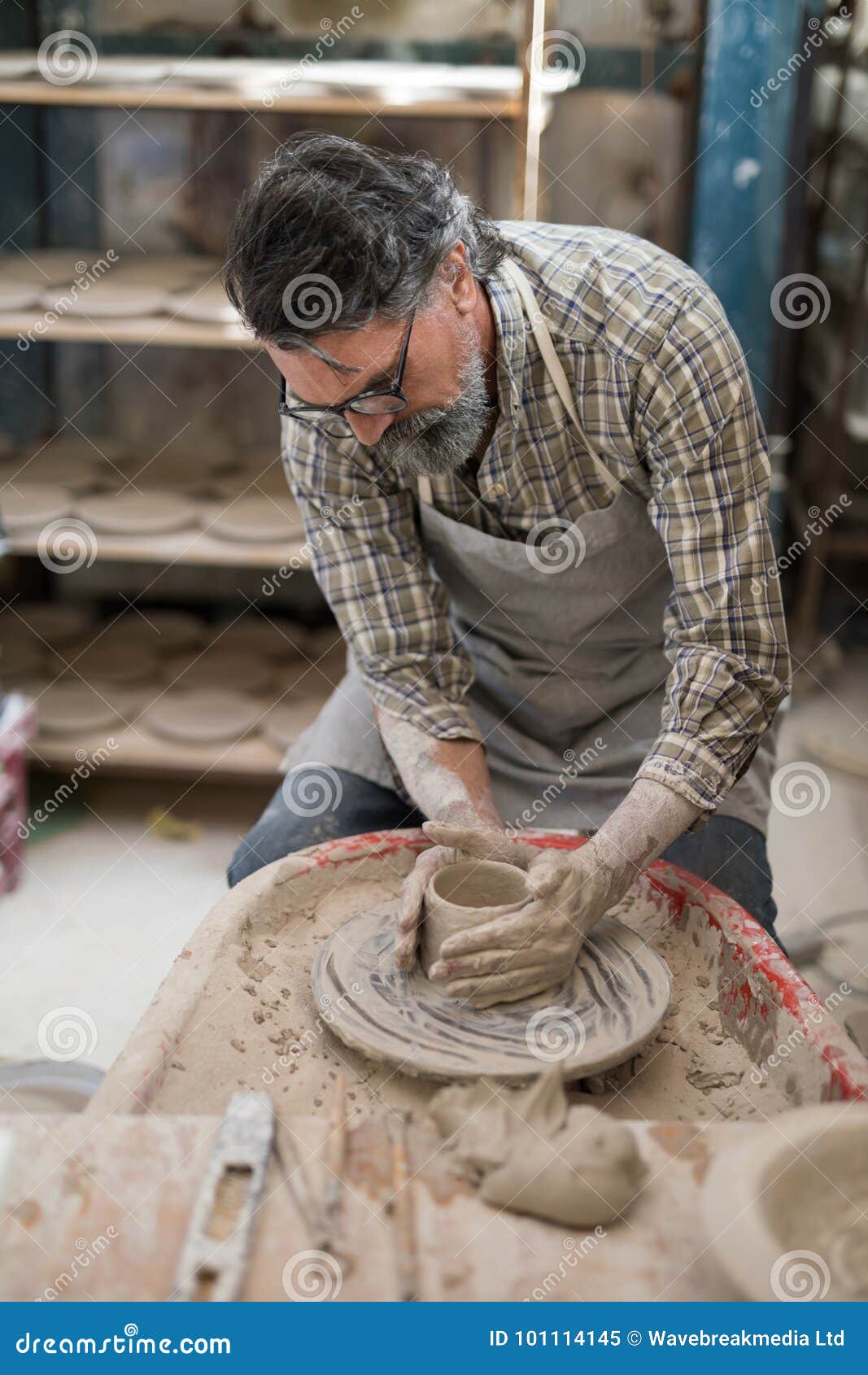 Male potter molding clay stock image. Image of creating - 101114145