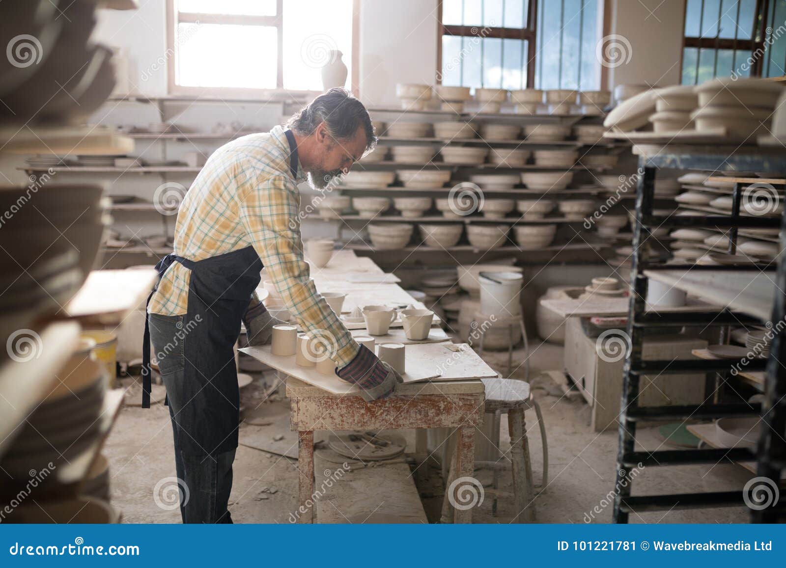 Male Potter Working at Worktop Stock Image - Image of craftsperson ...