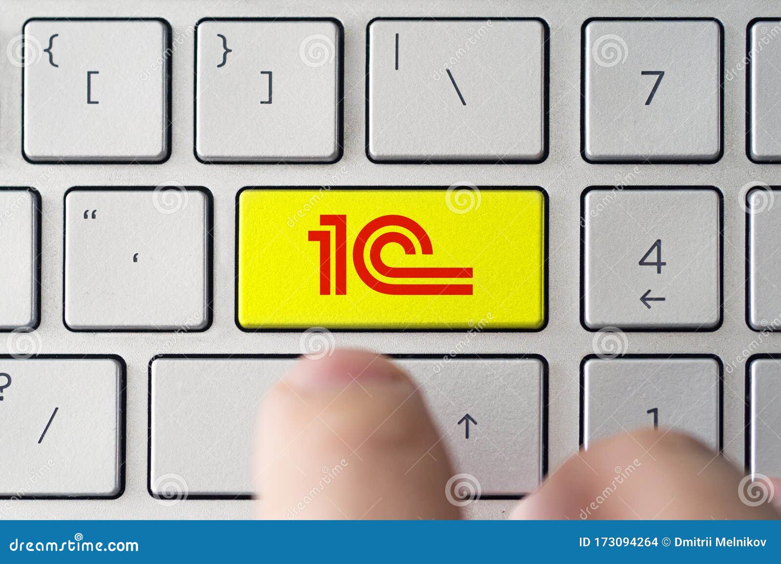 Male Presses Button on Keyboard with the 1C Logo. 1C is a Russian ...