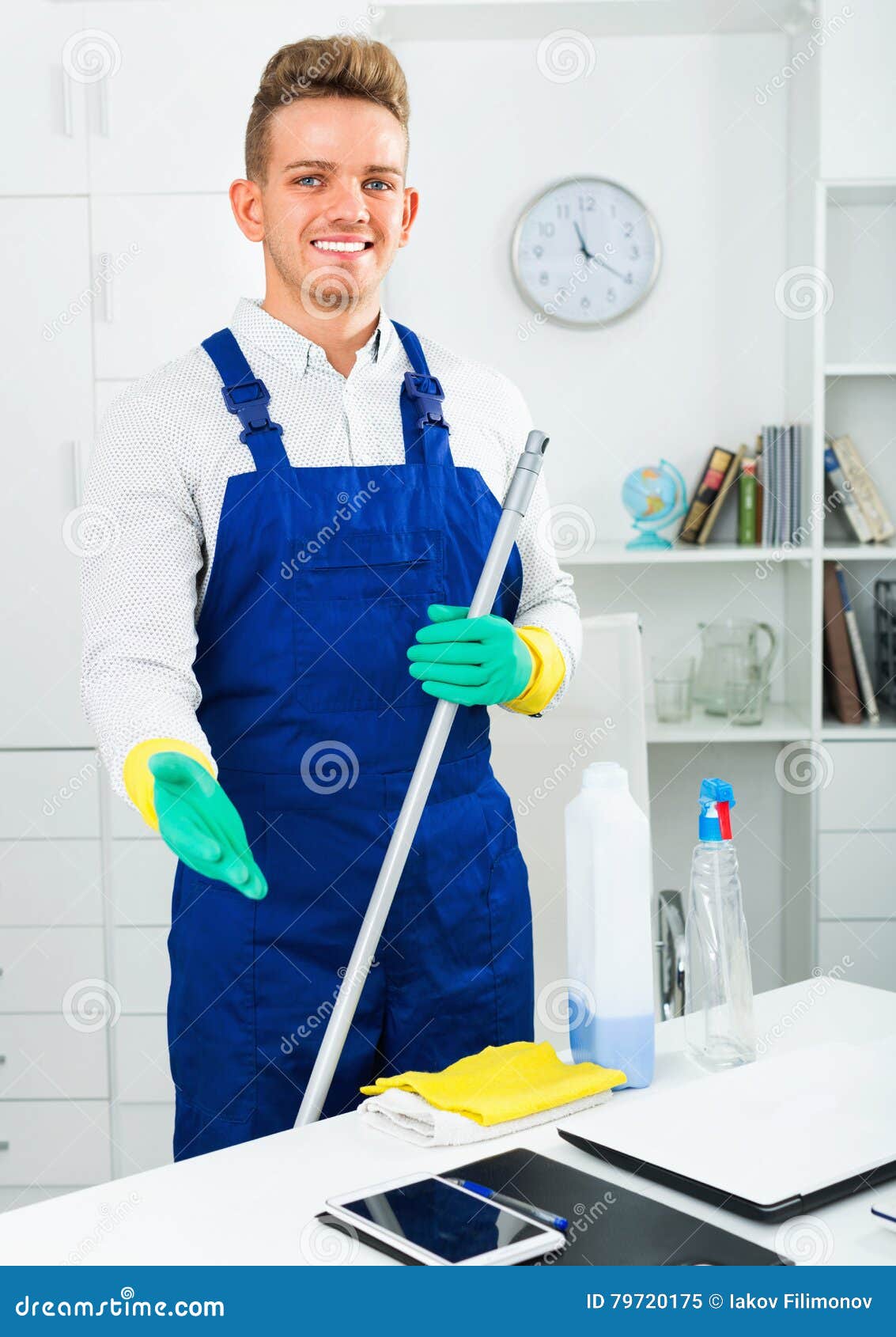 Male Professional Janitor Dusting in Office Stock Image - Image of maid ...