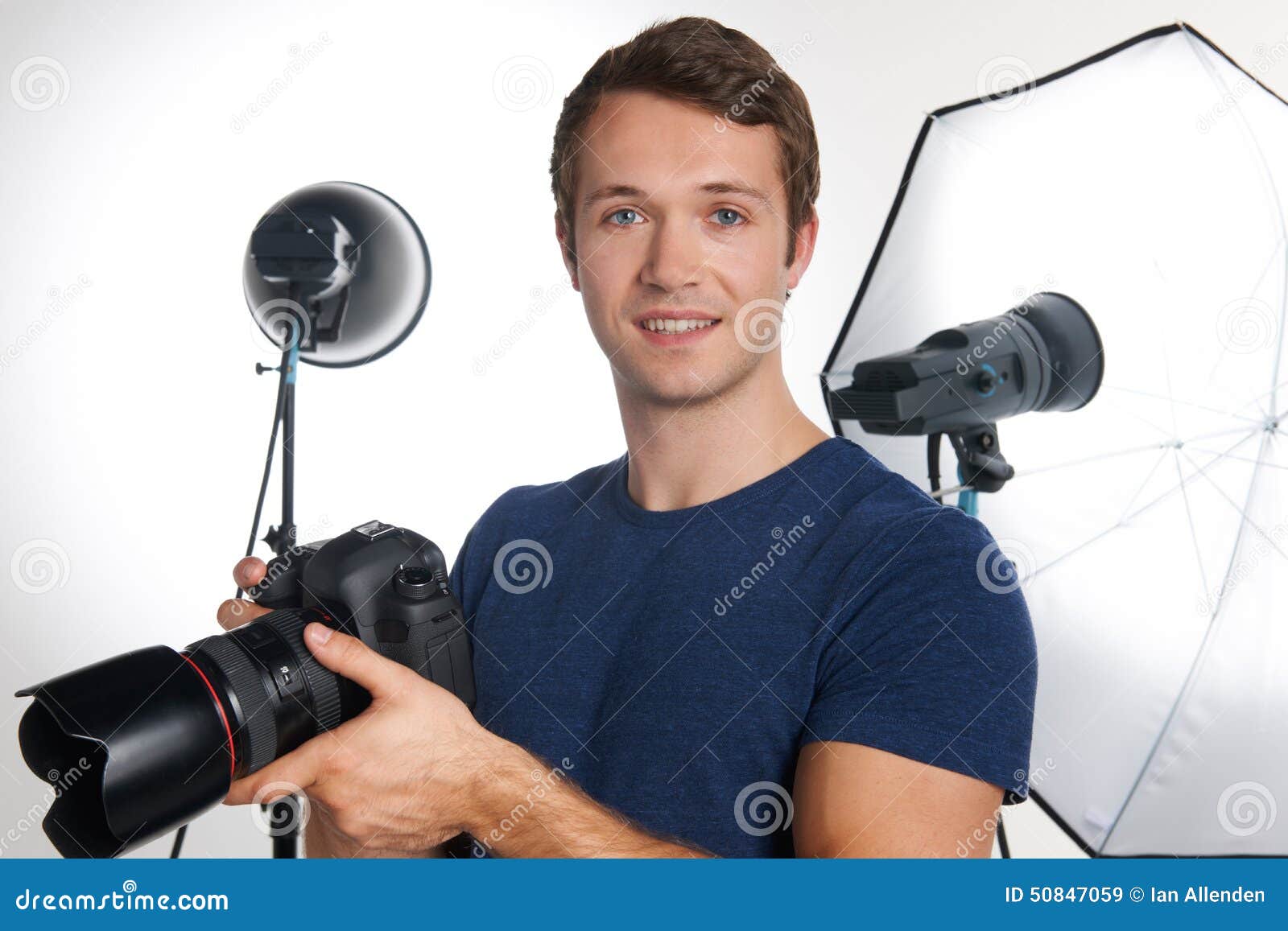 Male Professional Photographer Working in Studio Stock Image - Image of ...