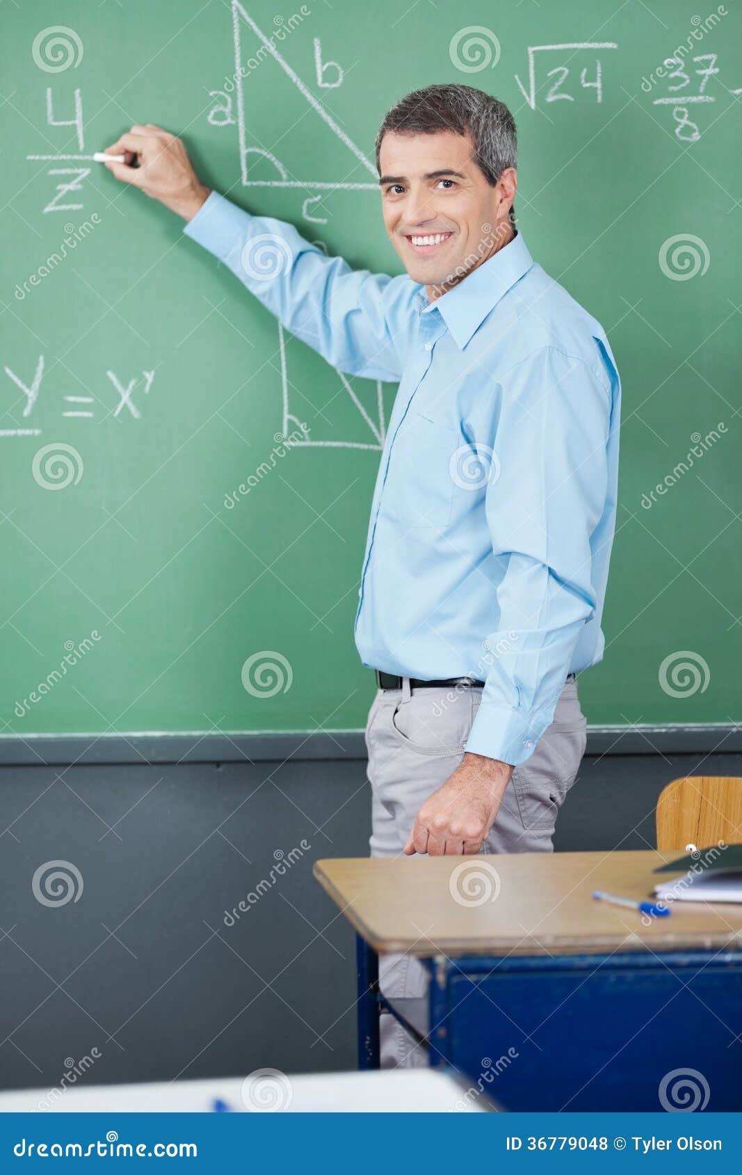 Male Professor Writing Formula On Board Stock Photo - Image: 36779048