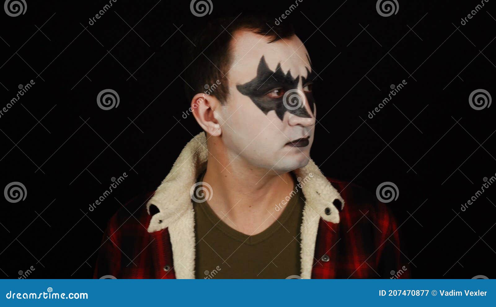 Male Profile in Scary Demon Makeup Looks Sideways Stock Video - Video ...