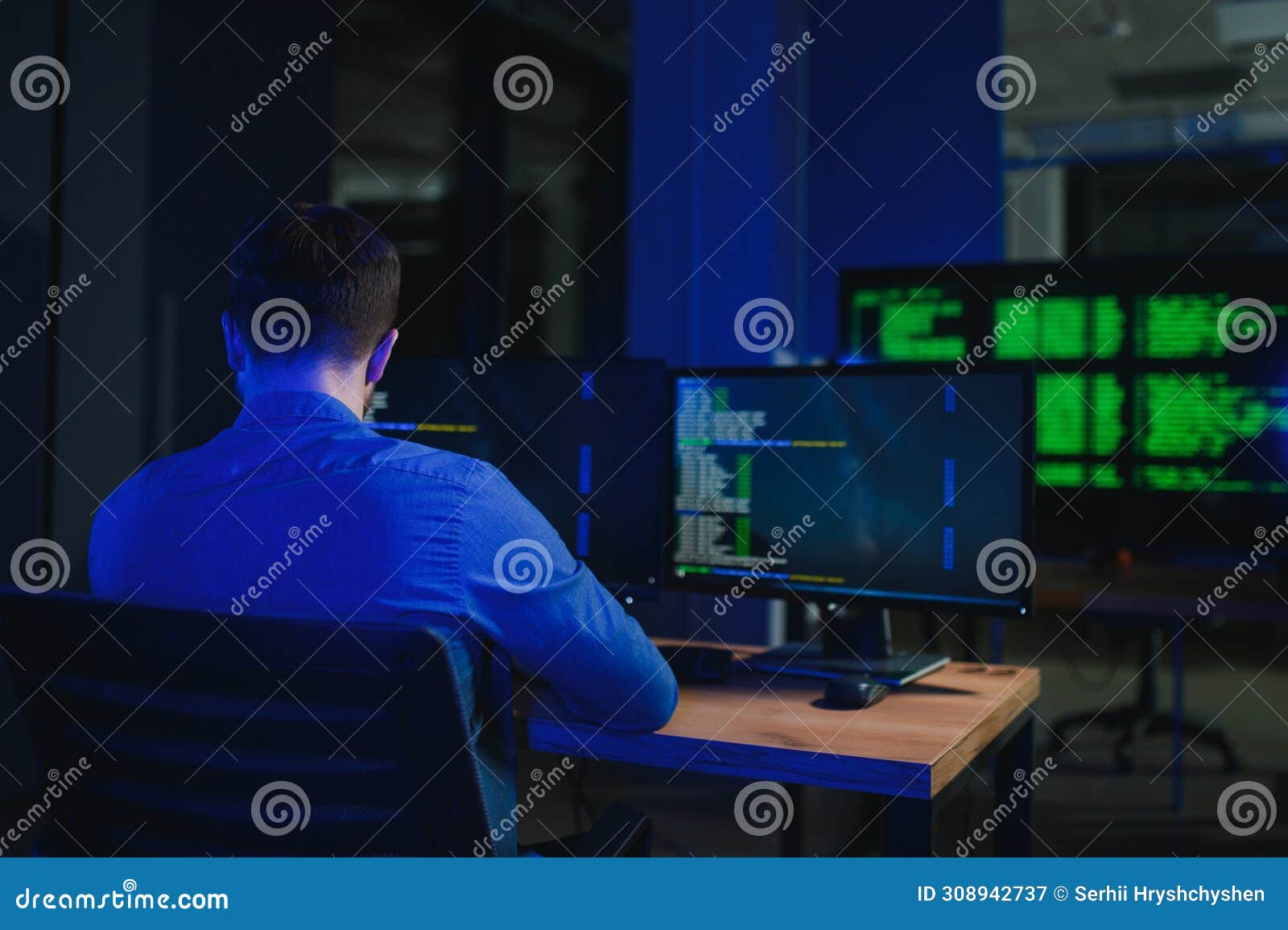 Male Programmer Working on Desktop Computer at White Desk in Office ... Male Programmer Working on Desktop Computer at White Desk in Office ...
