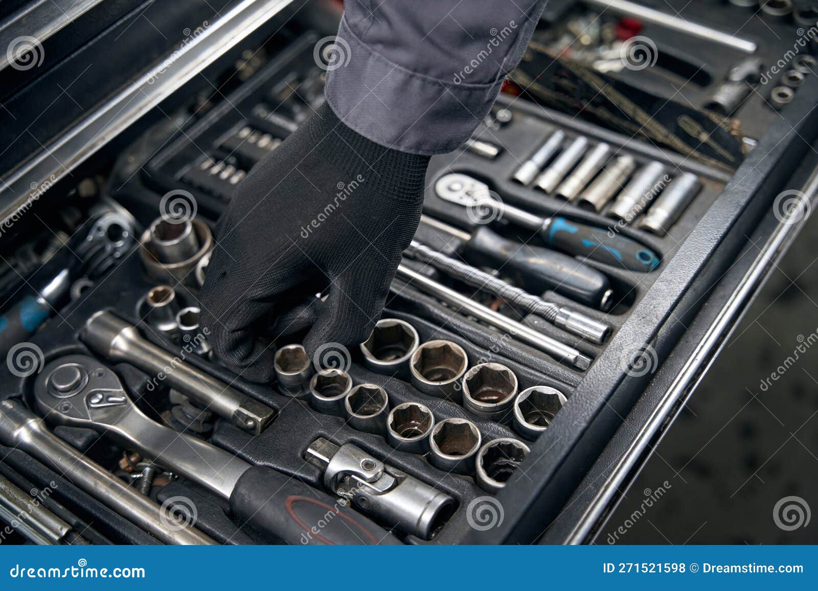 Mechanic Chooses Instruments for Car Repair at Work Stock Photo - Image ...