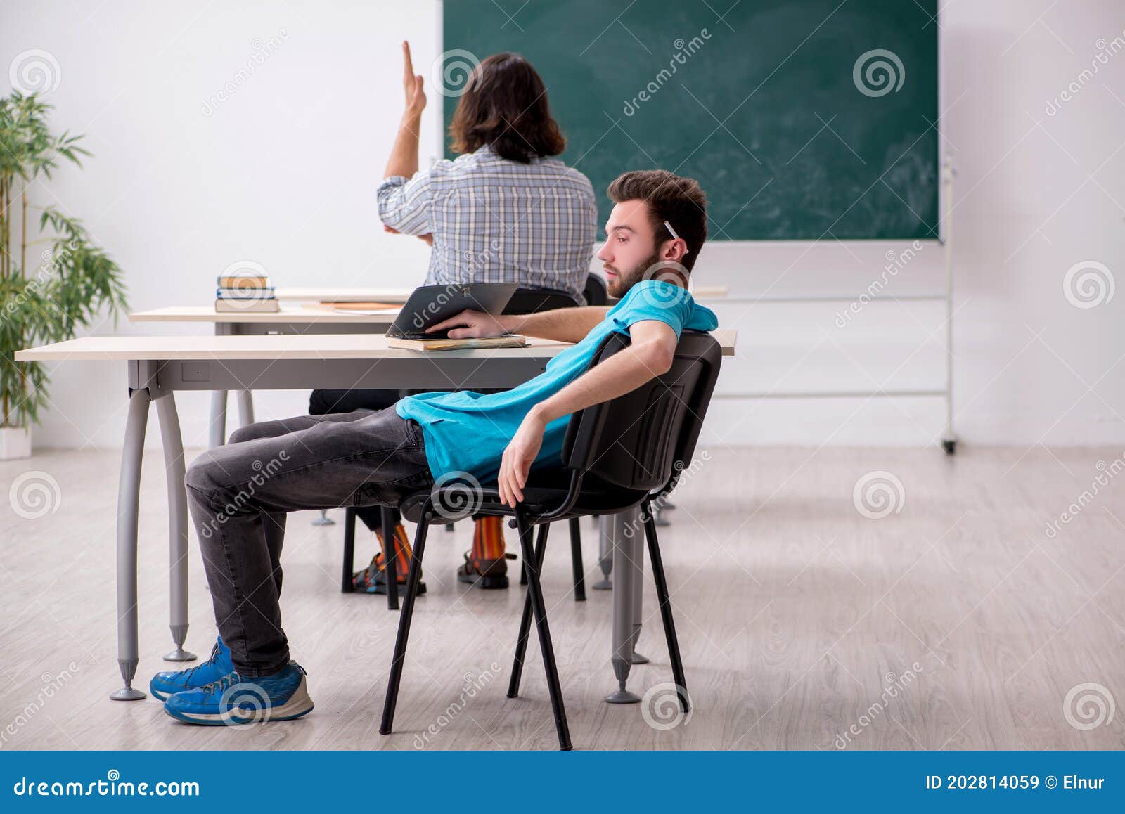 Two Male Pupils in Bullying Concept in the Classroom Stock Image ...