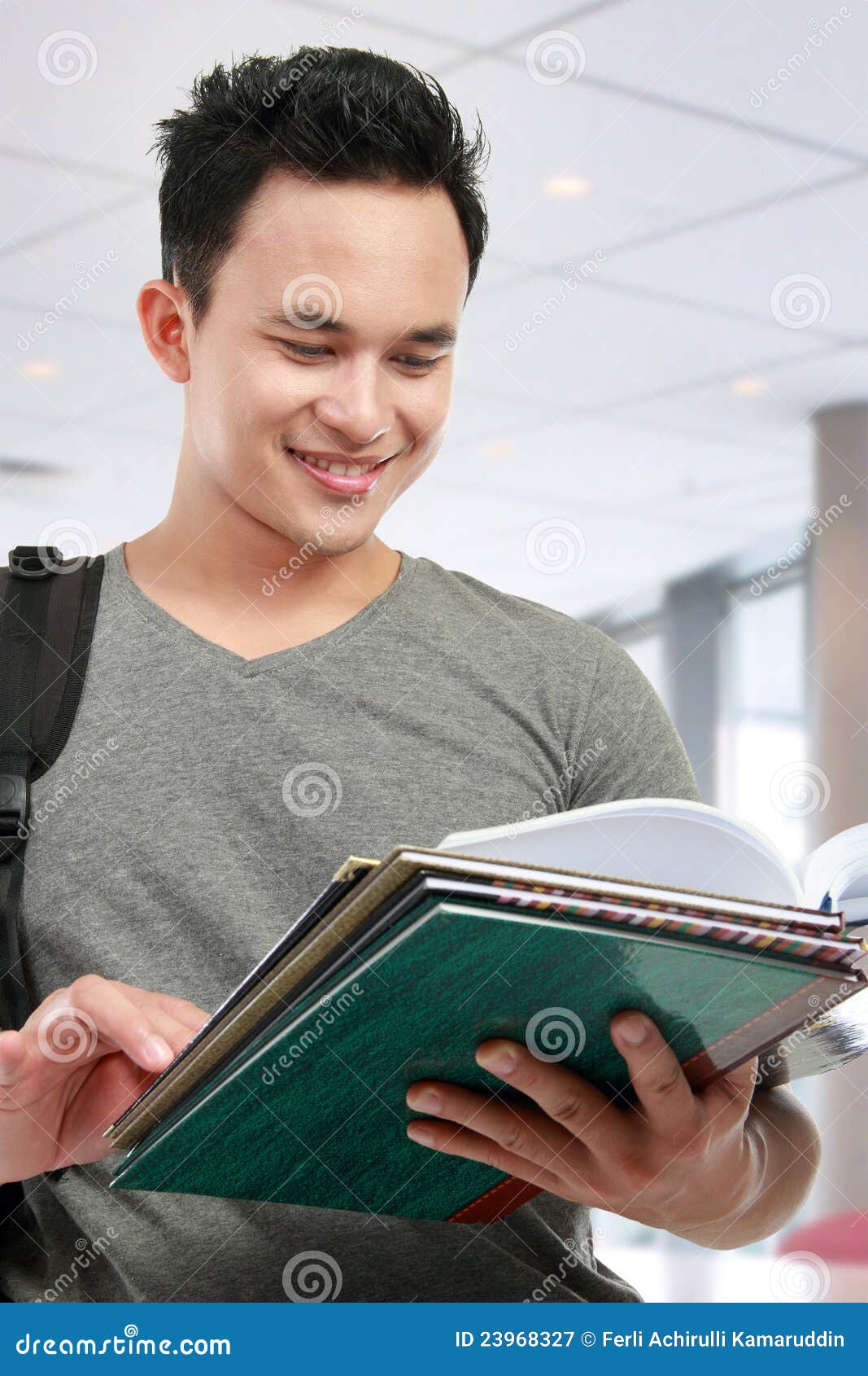 Male reading a book stock image. Image of college, think - 23968327