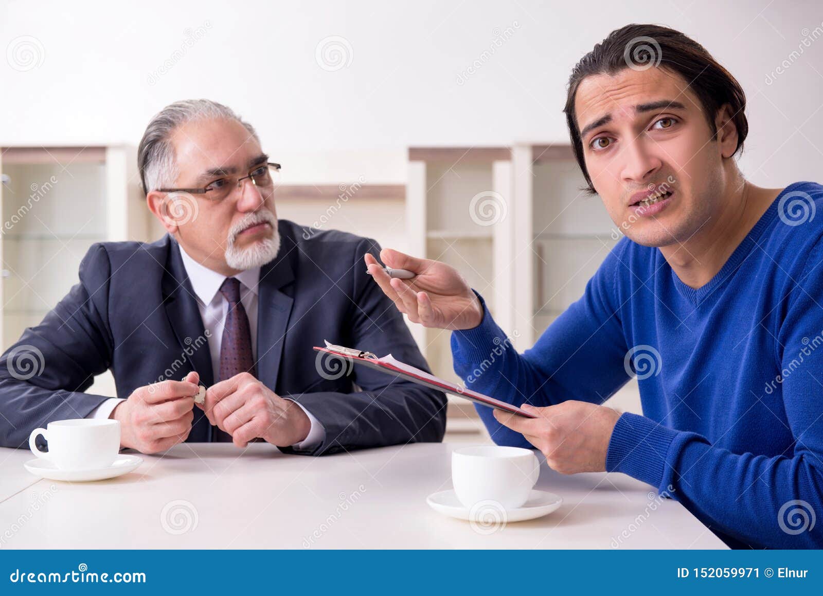 Male Real Estate Agent and Male Client in the Apartment Stock Image ...