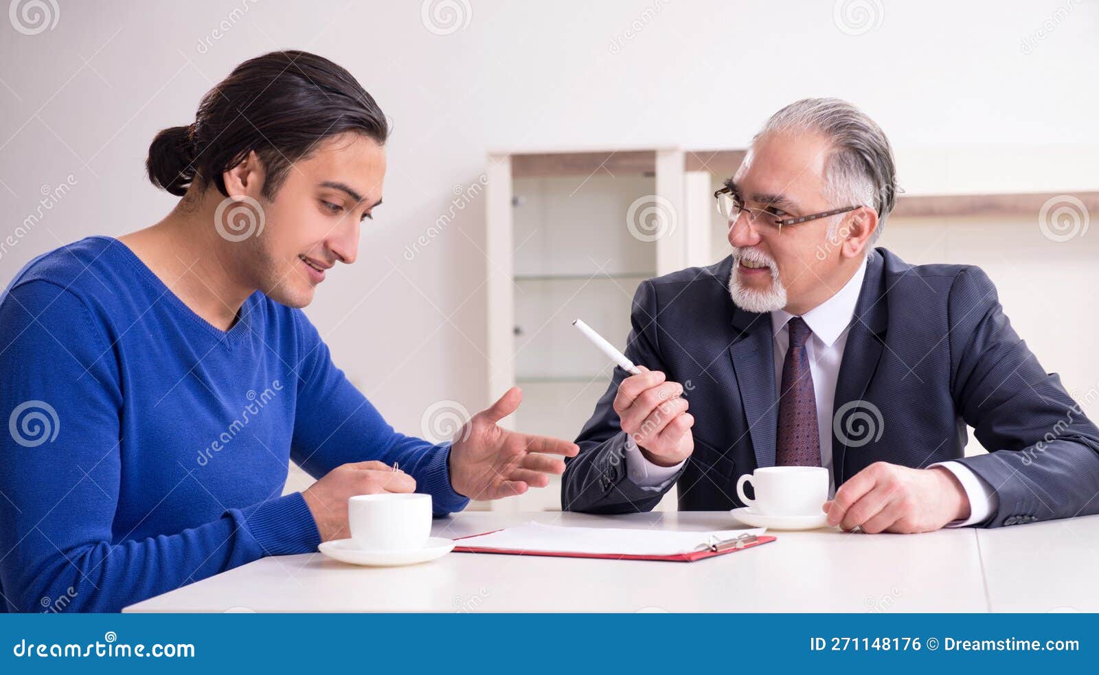 Male Real Estate Agent and Male Client in the Apartment Stock Photo ...