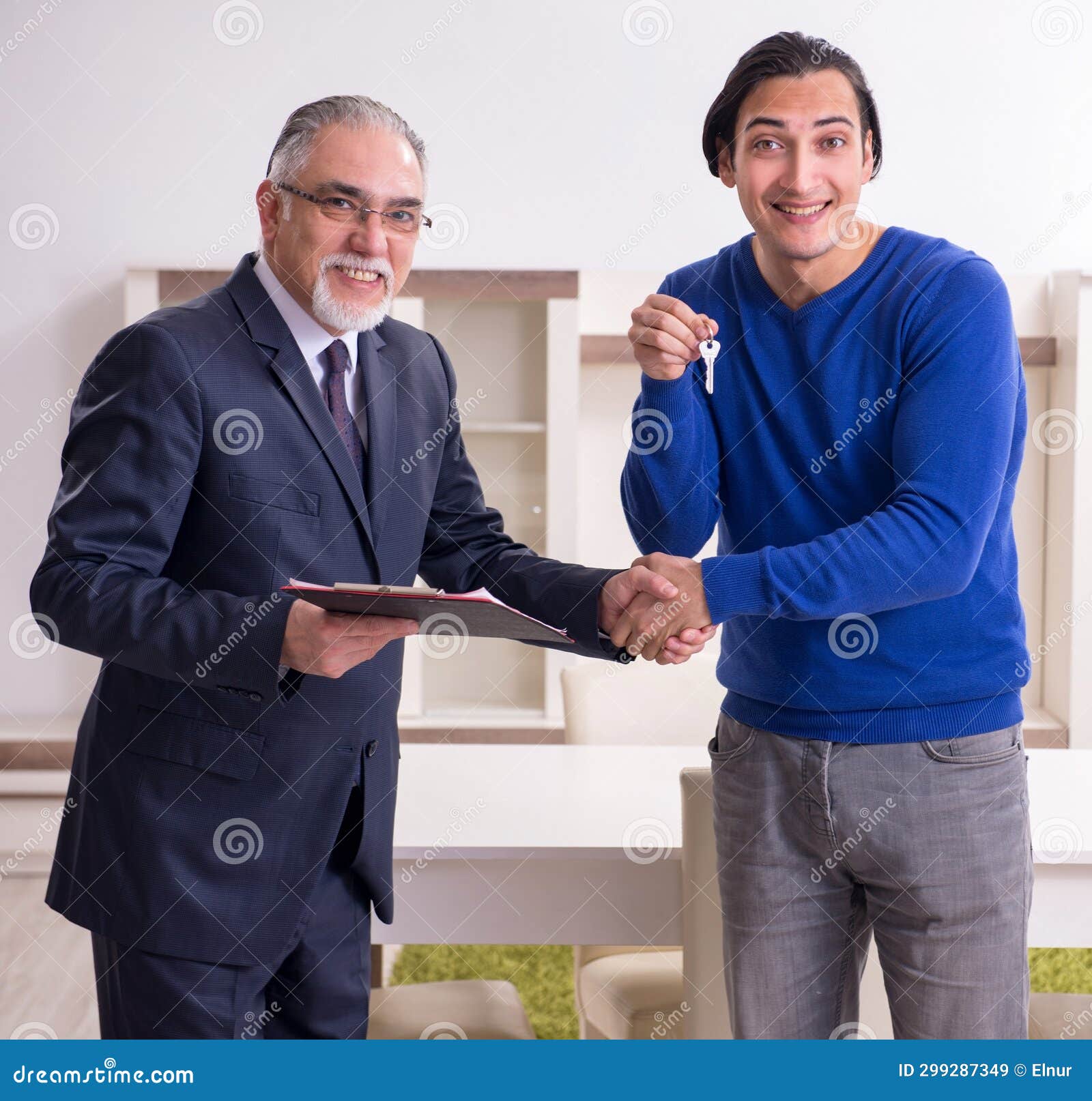 Male Real Estate Agent and Male Client in the Apartment Stock Image ...