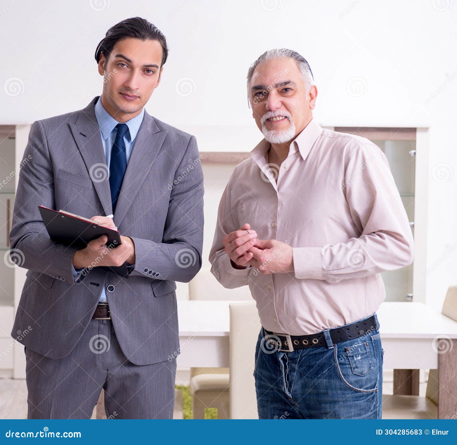 Male Real Estate Agent and Male Client in the Apartment Stock Image ...