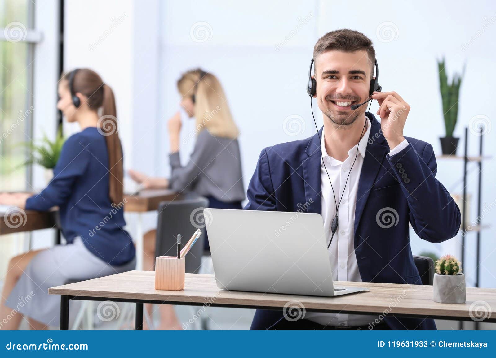 Male Receptionist with Headset at Desk Stock Image - Image of company ...