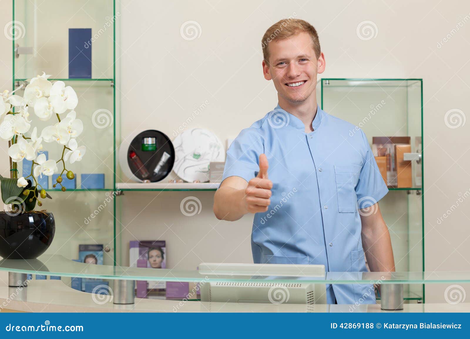 Male Receptionist with Okay Gesture Stock Photo - Image of staff ...