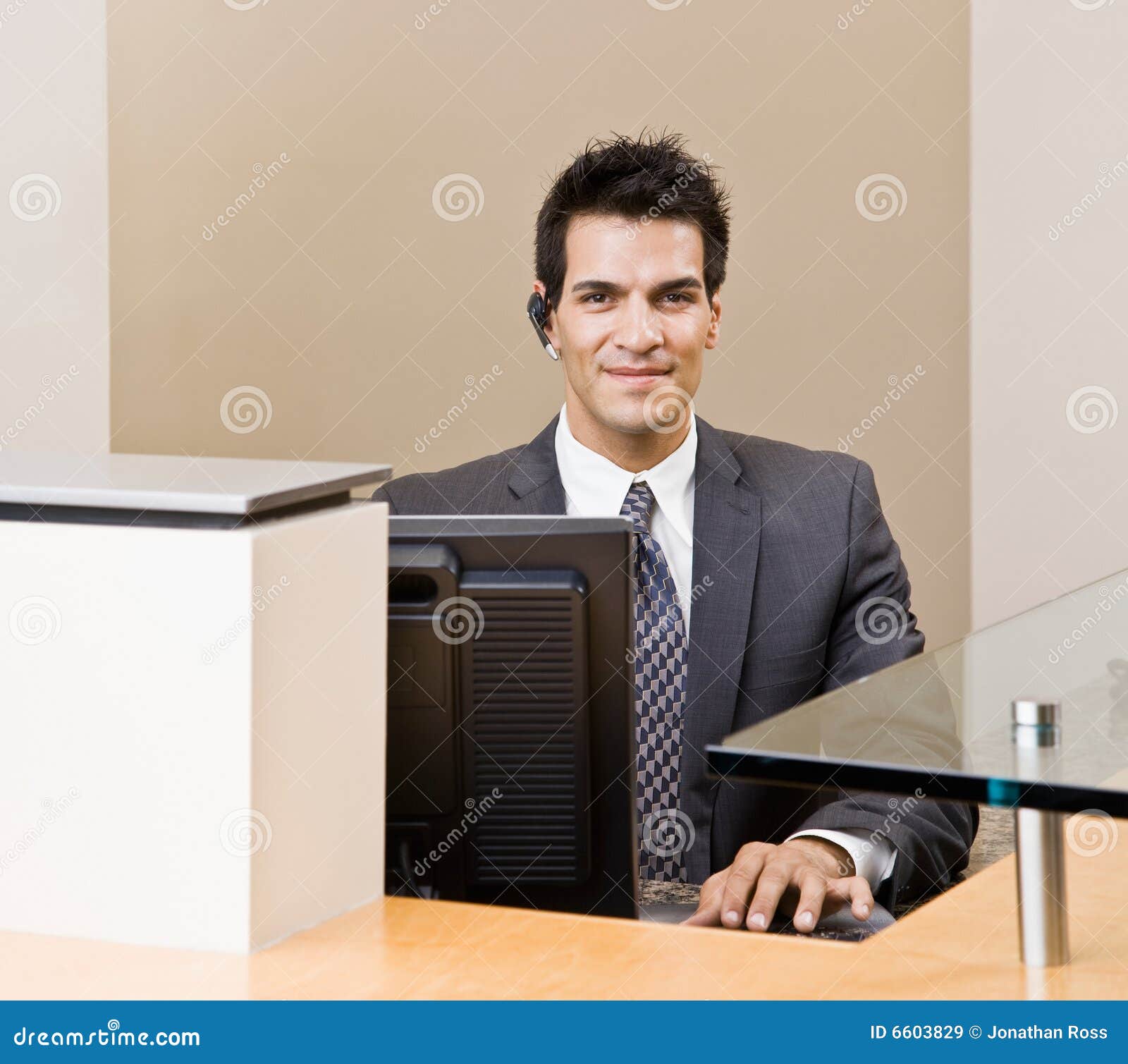 Male Receptionist with Telephone Earpiece Stock Image - Image of ...