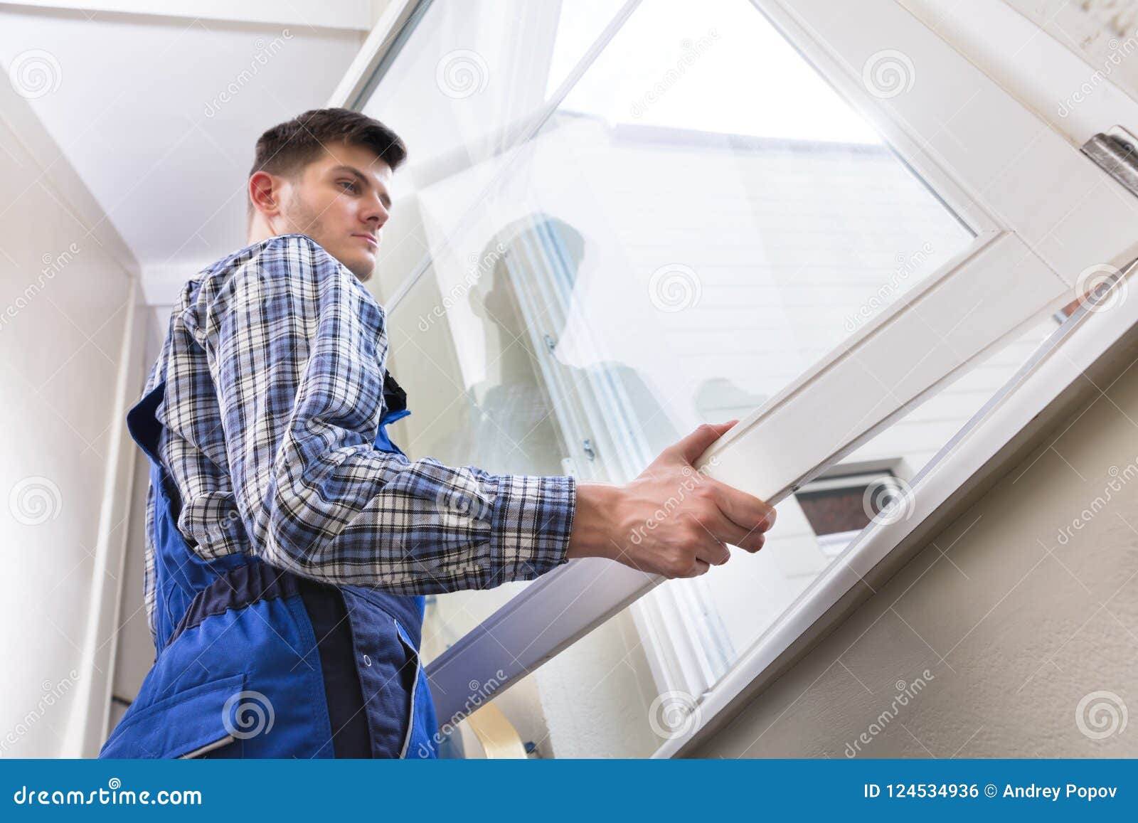 Male Repairman Installing Window Stock Photo - Image of home, equipment ...
