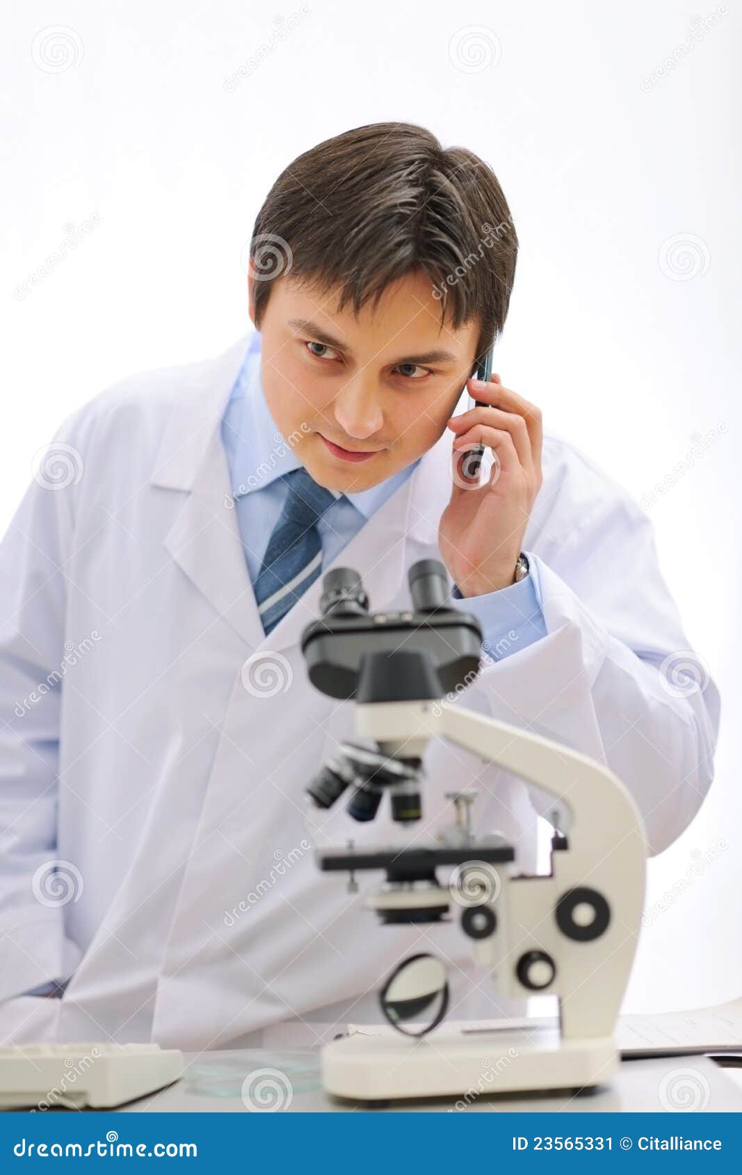 Male Researcher Speaking Cellular in Lab Stock Image - Image of mobile ...