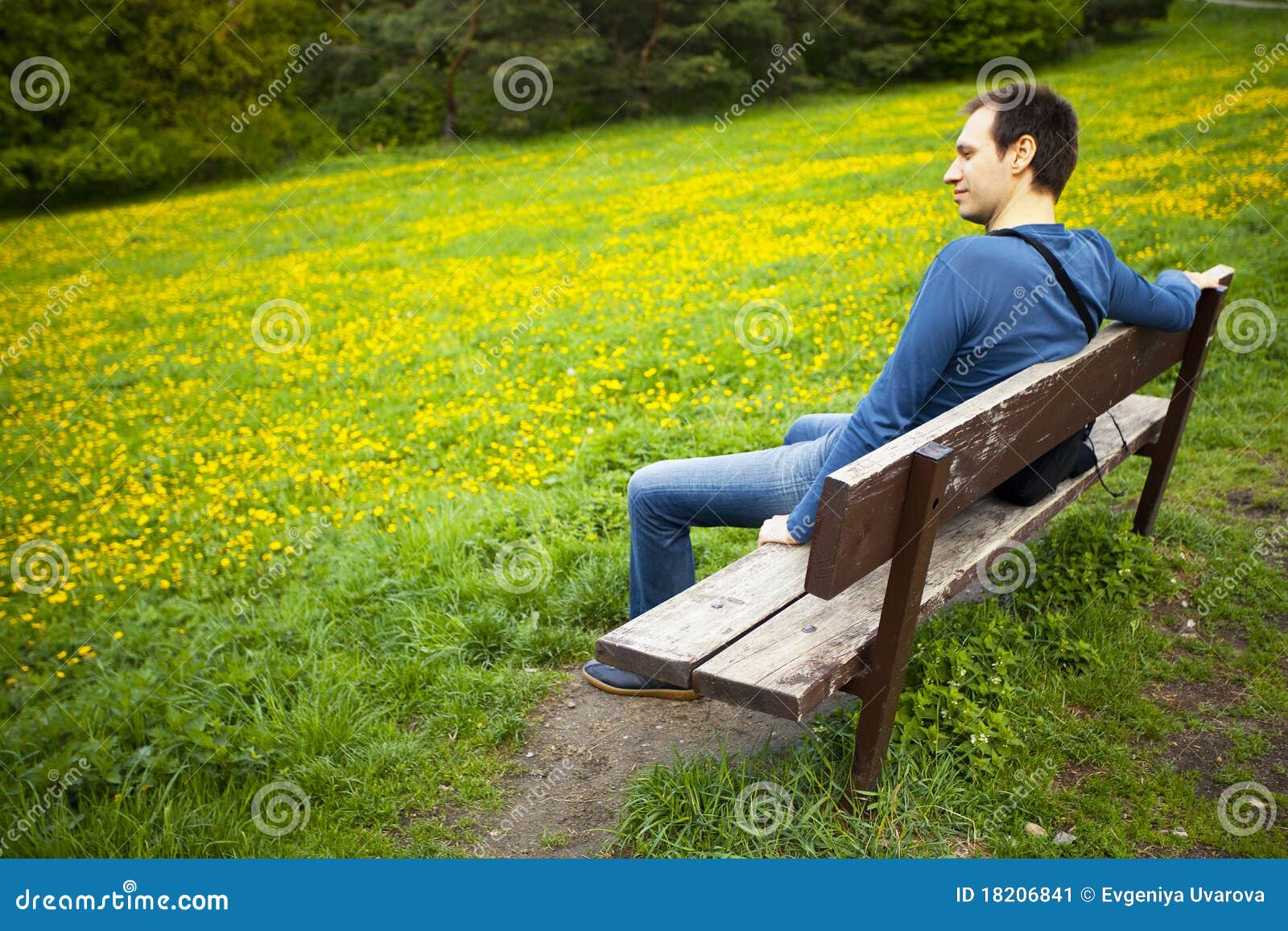 Male resting on the bench stock image. Image of flora - 18206841