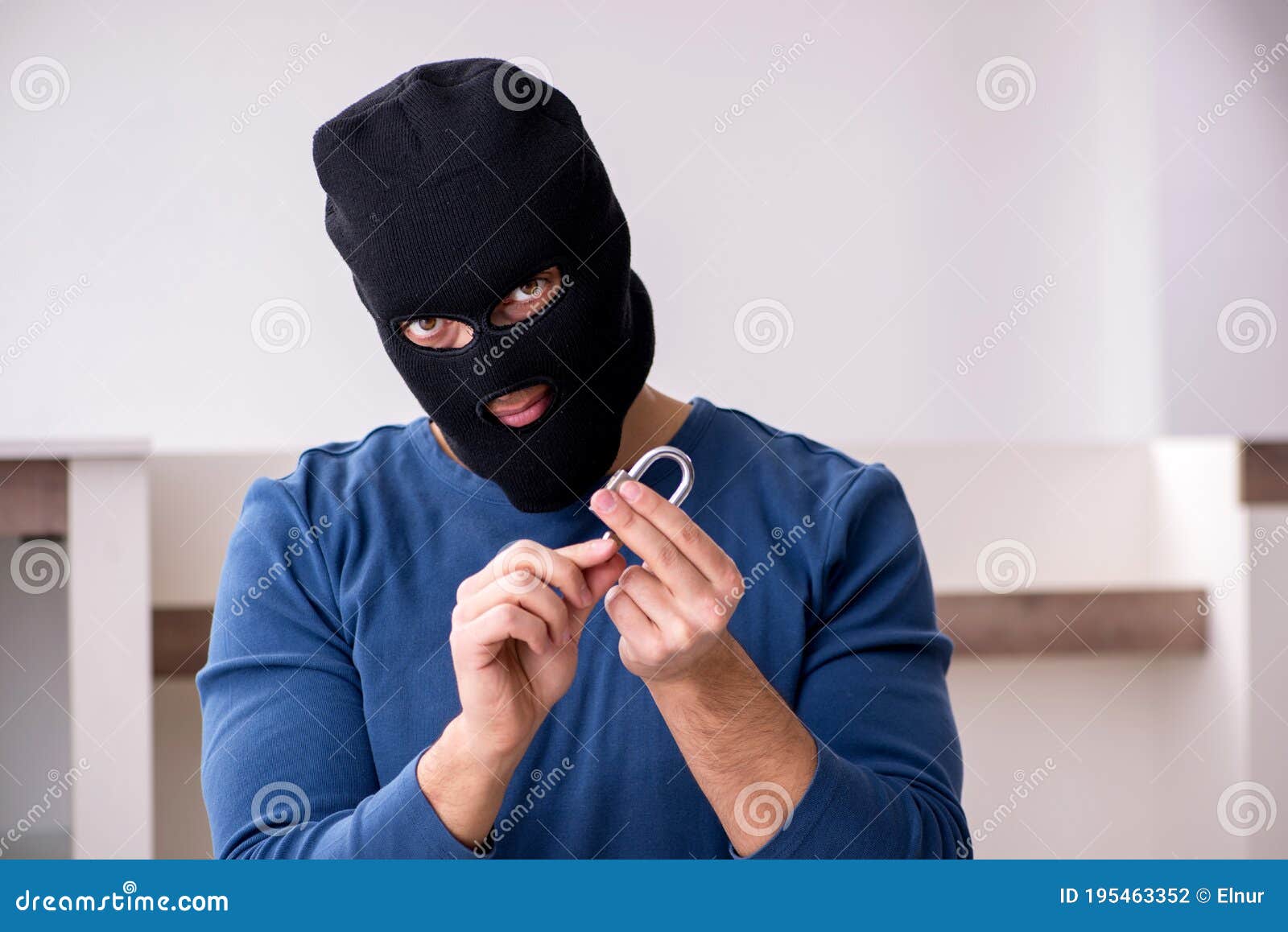 Male Robber Stealing Valuable Things from the House Stock Photo - Image ...