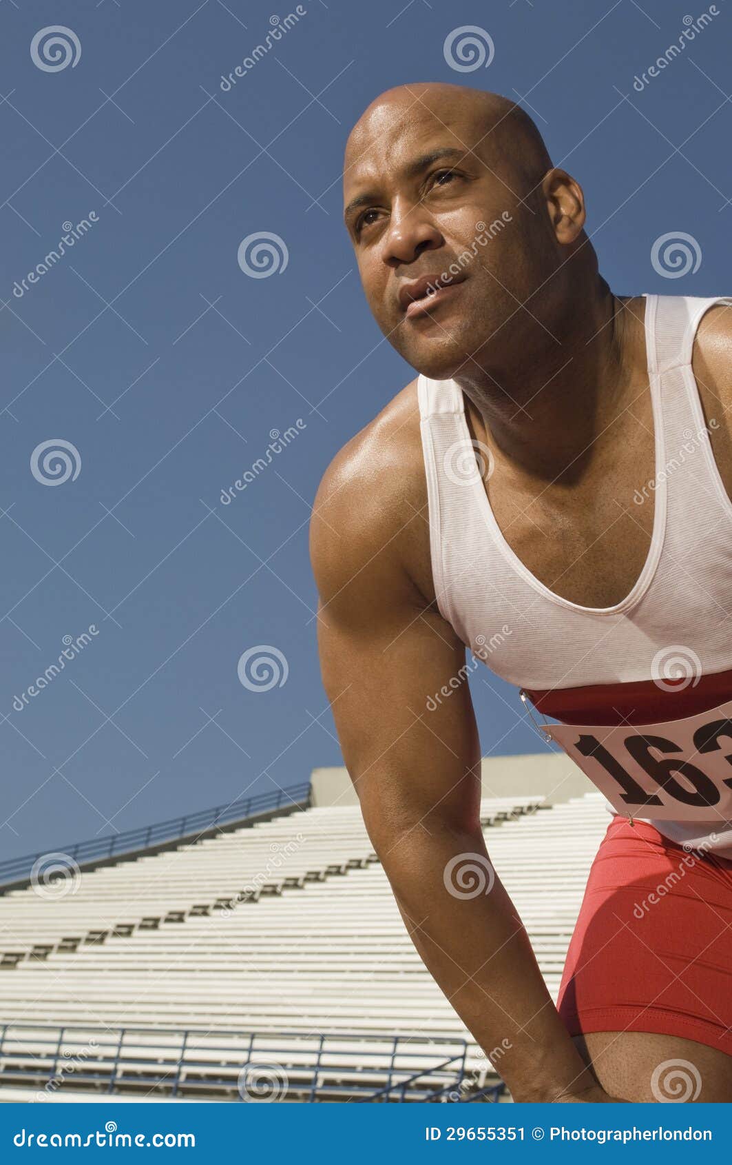 Male Runner in Athletic Field Stock Image - Image of compete, person ...