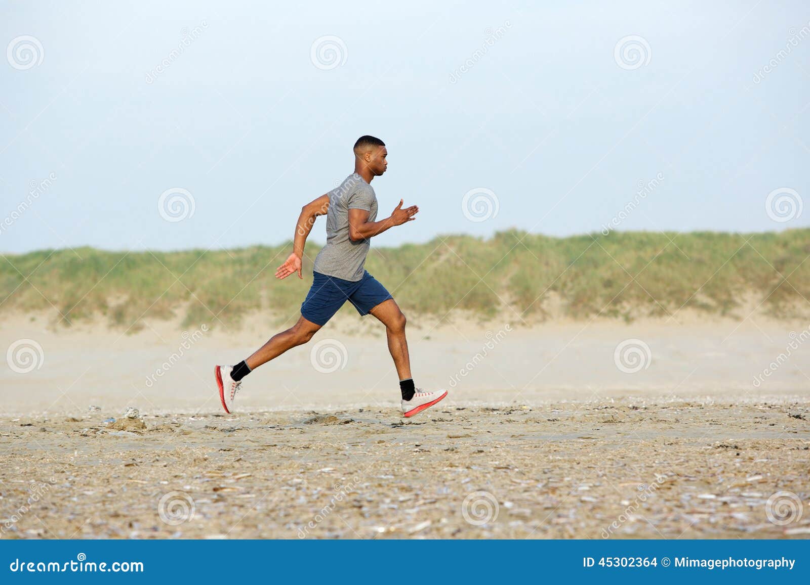 Male Runner Exercising on the Beach Stock Photo - Image of care ...
