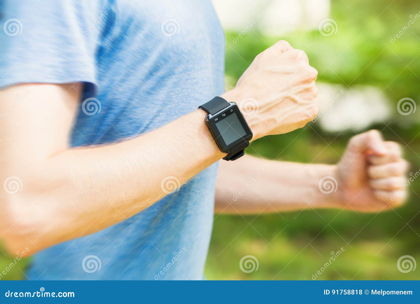 Male Runner Jogging Outside with His Smart Watch Stock Photo - Image of ...