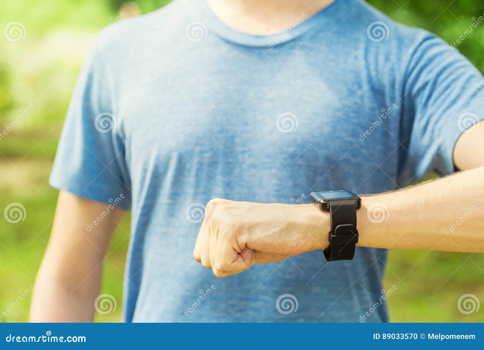 Male Runner Looking at His Smartwatch Stock Photo - Image of pulse ...