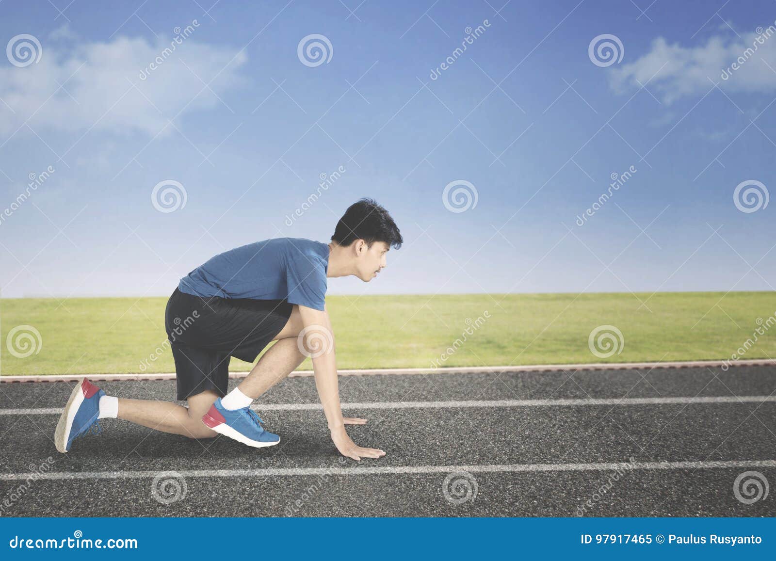Male Runner in Ready Position To Run Stock Image - Image of exercise ...