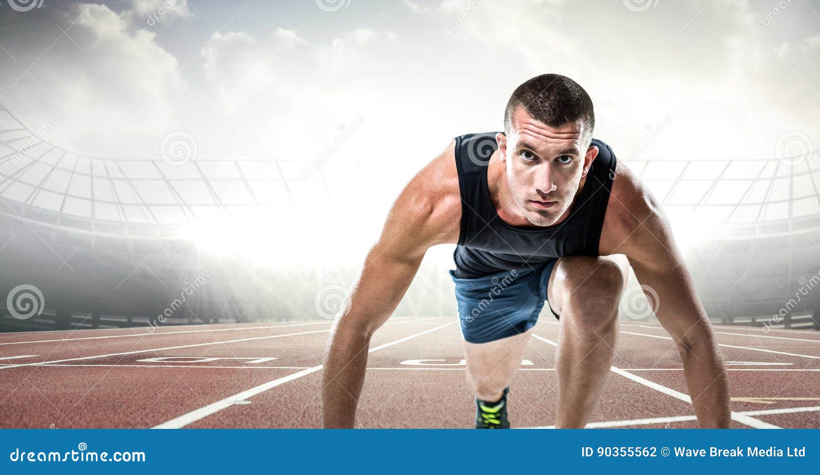 Male Runner on Track Against Flares Stock Photo - Image of field ...