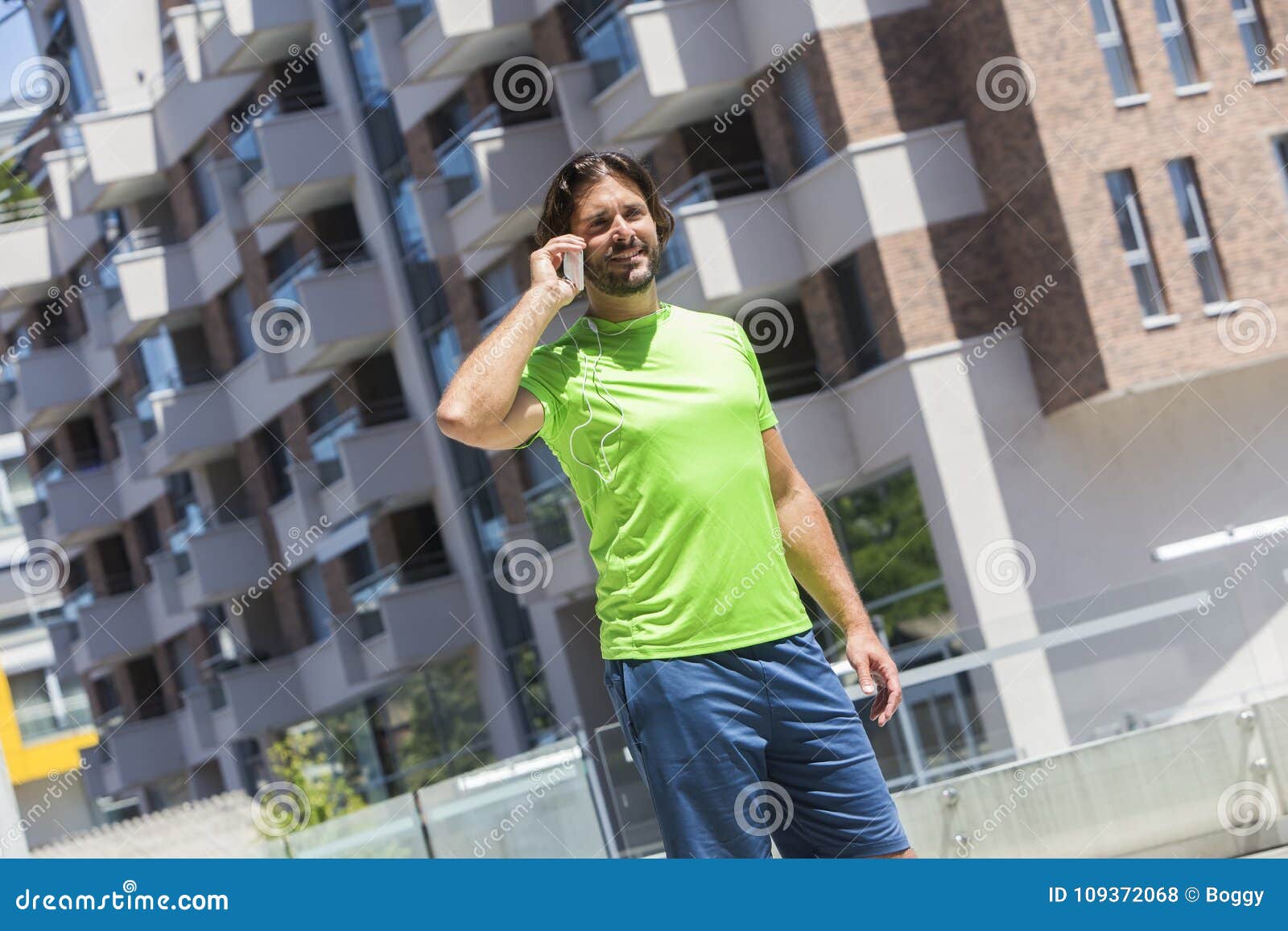 Male Runner Using Mobile Phone Outdoor Stock Photo - Image of jogging ...