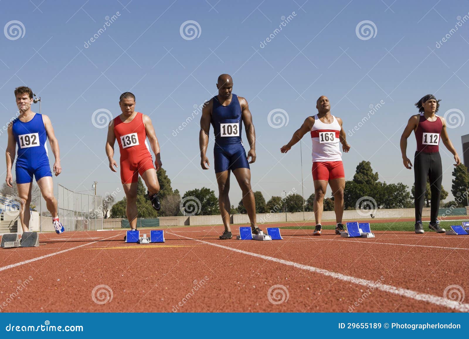 Male Runners at Starting Line Stock Image - Image of field, block: 29655189