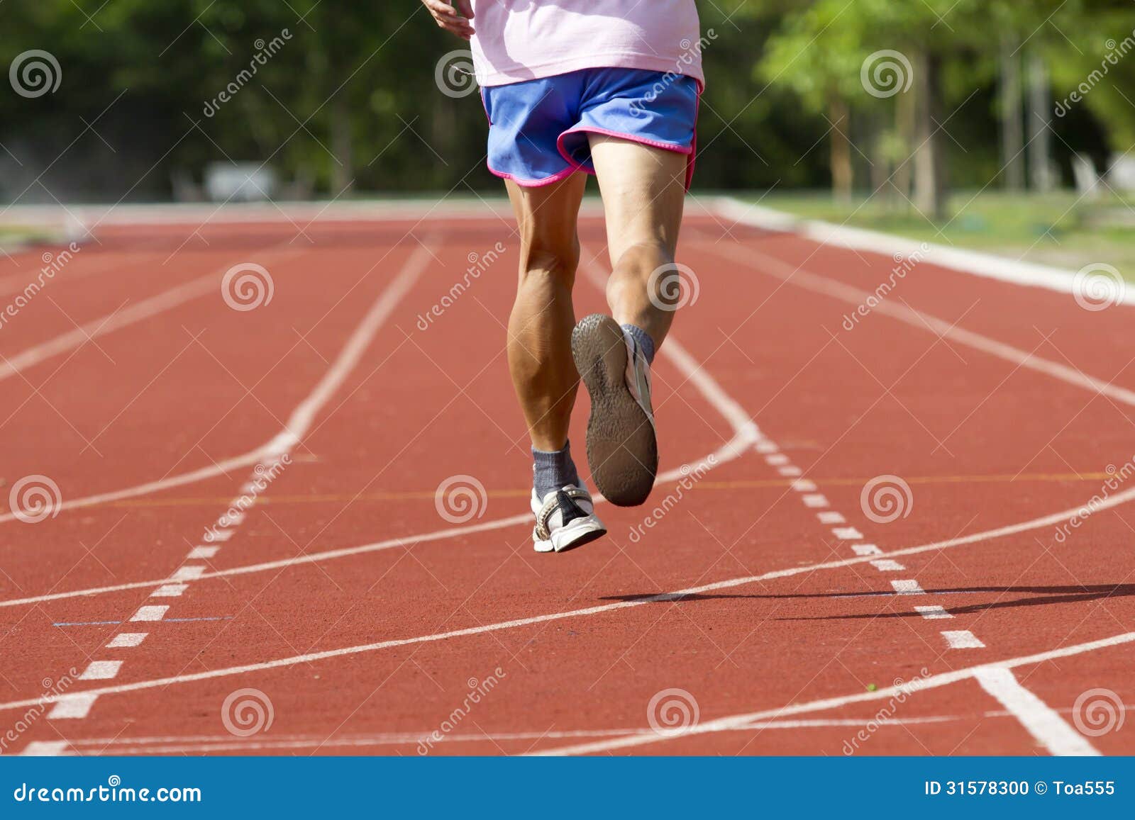 Male Running at a Track and Field Stock Photo - Image of cheerful ...